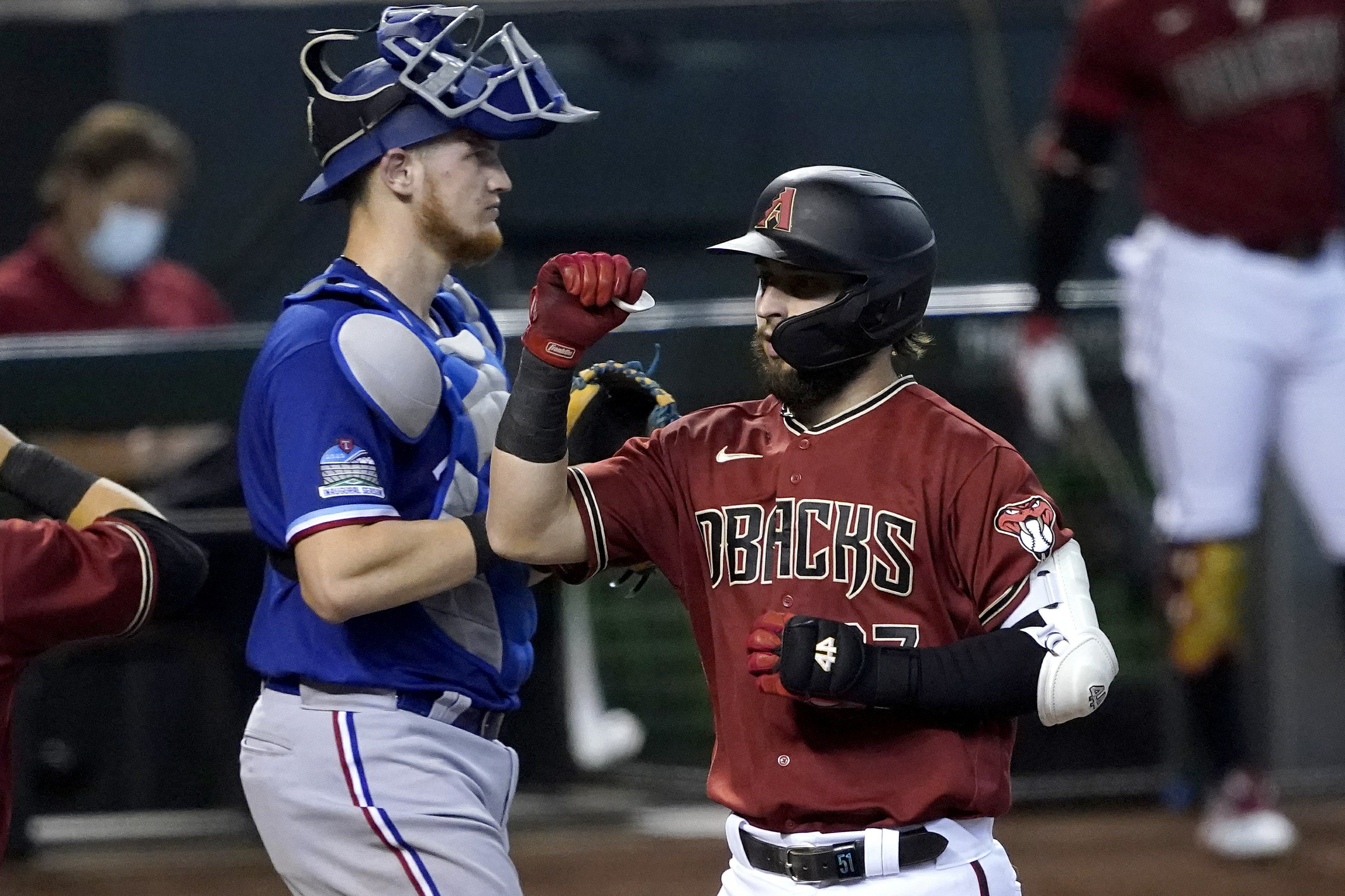 Rookie Mathisen hits 2 HRs, D-backs beat Rangers 7-3 | AP News