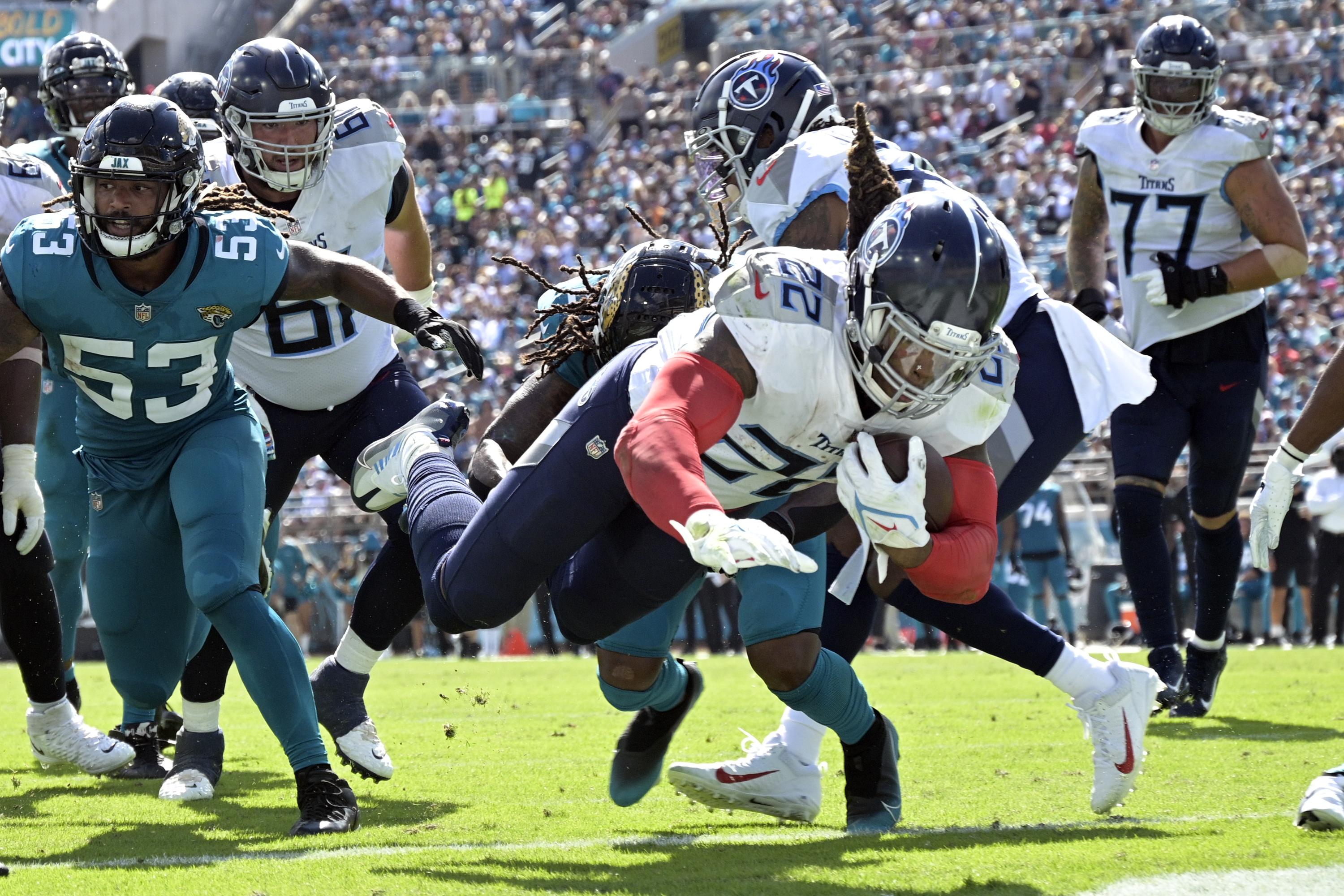 Henry scores 3 TDs; Titans send Jags to 20th straight loss | AP News