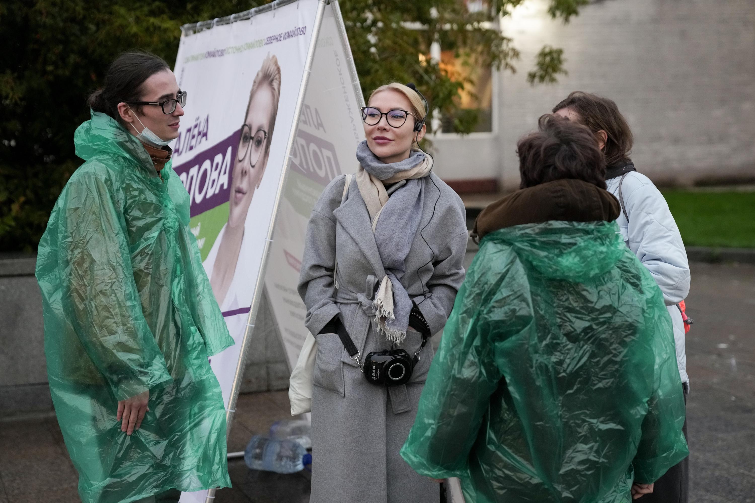 Russian feminist runs for Duma to take on domestic violence | AP News