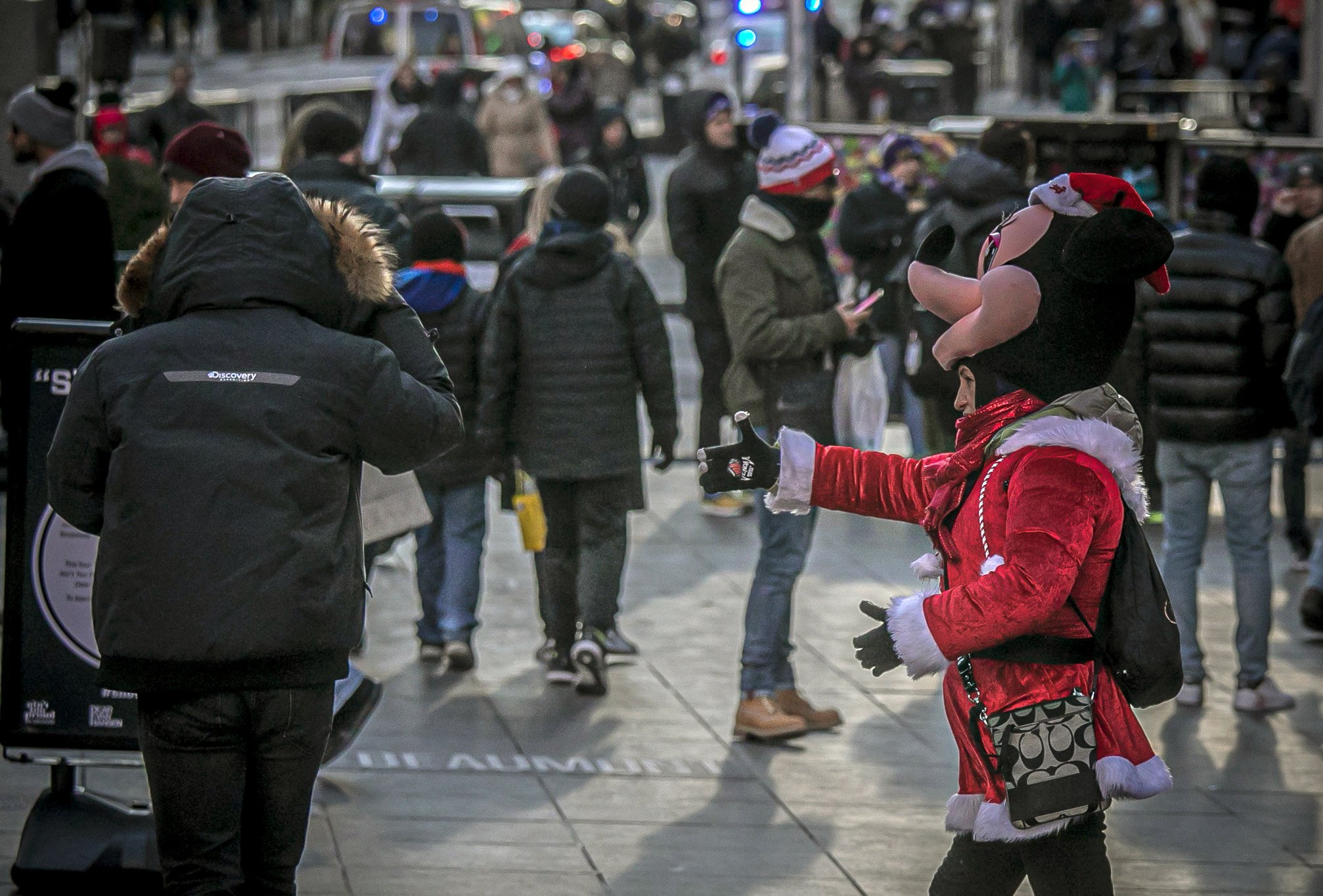 Times Square characters head to Rock Center for the holidays | AP News