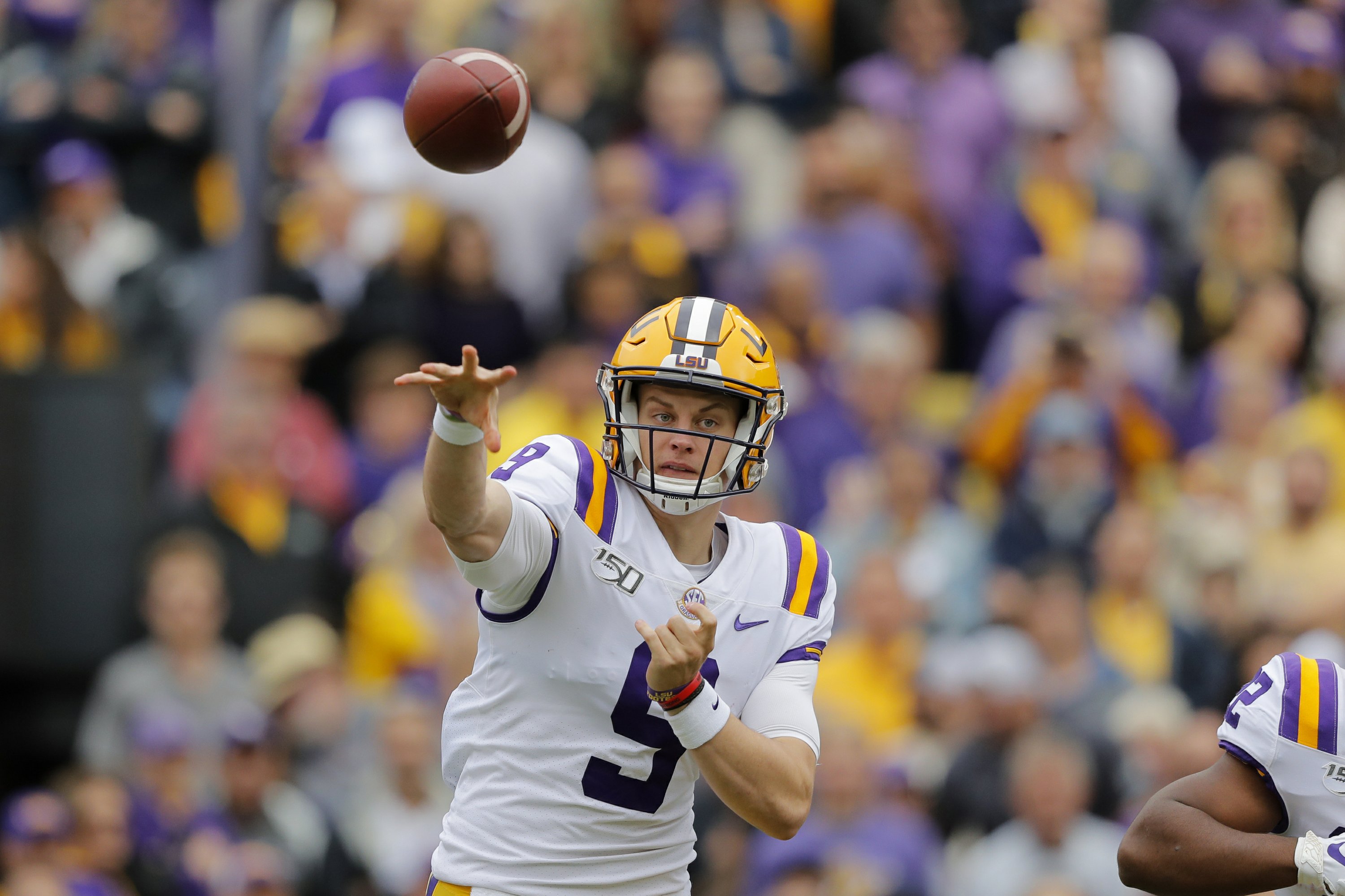 Burrow's 321 yards helps No. 2 LSU down No. 9 Auburn, 23-20 | AP News