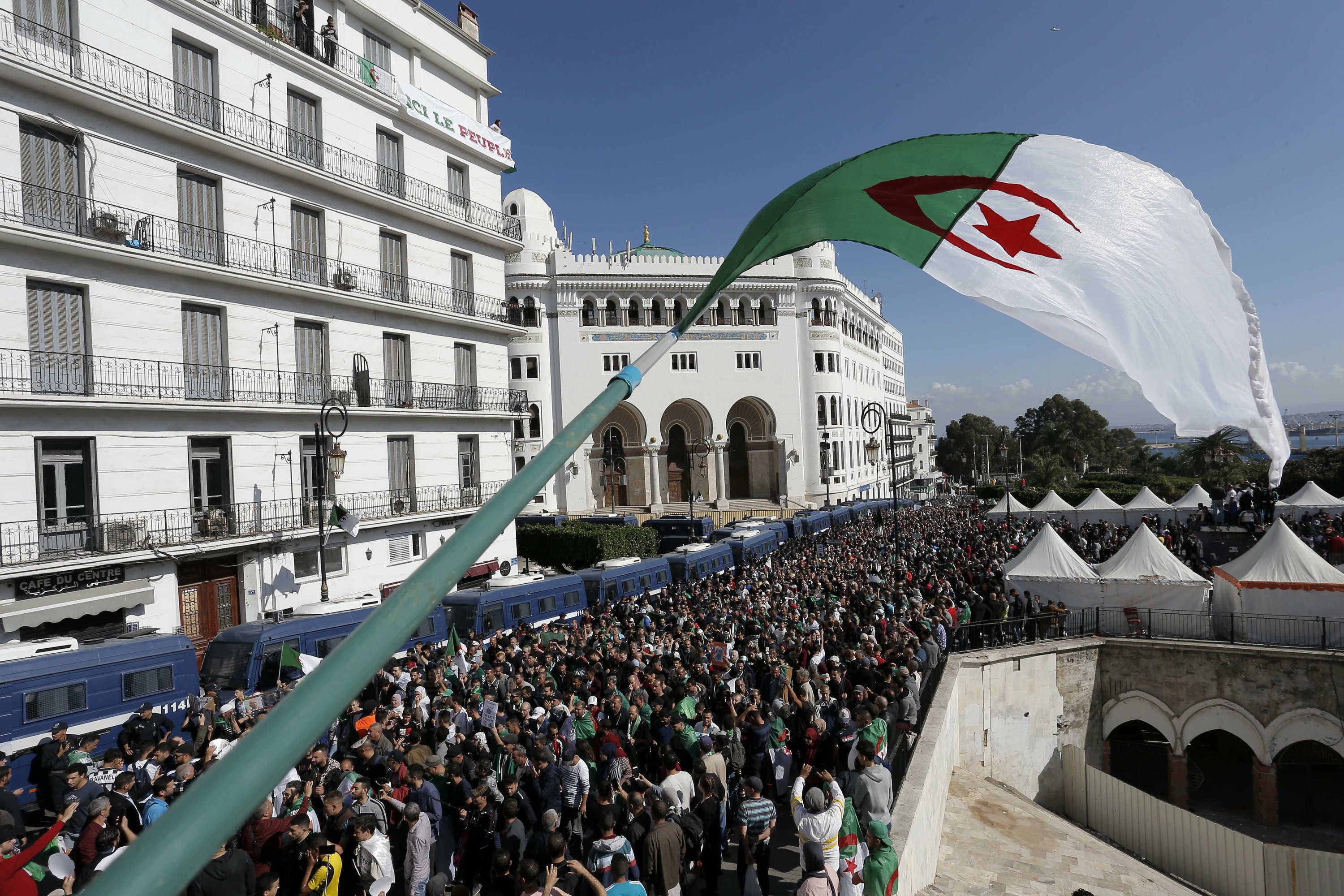 Algerians protest election plan, celebrate independence | AP News