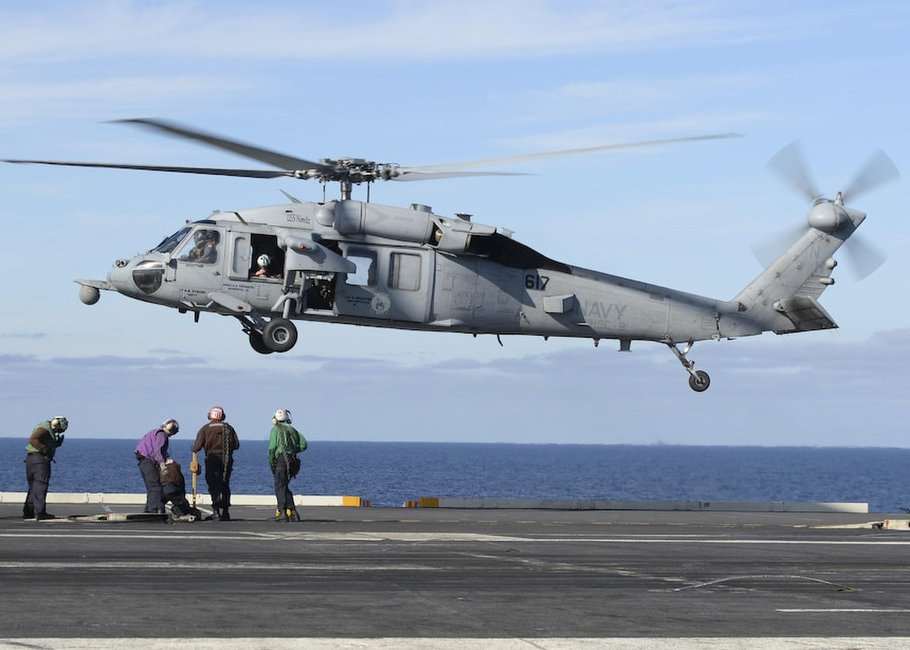 US Navy helicopter was vibrating before crash that killed 5 | AP News