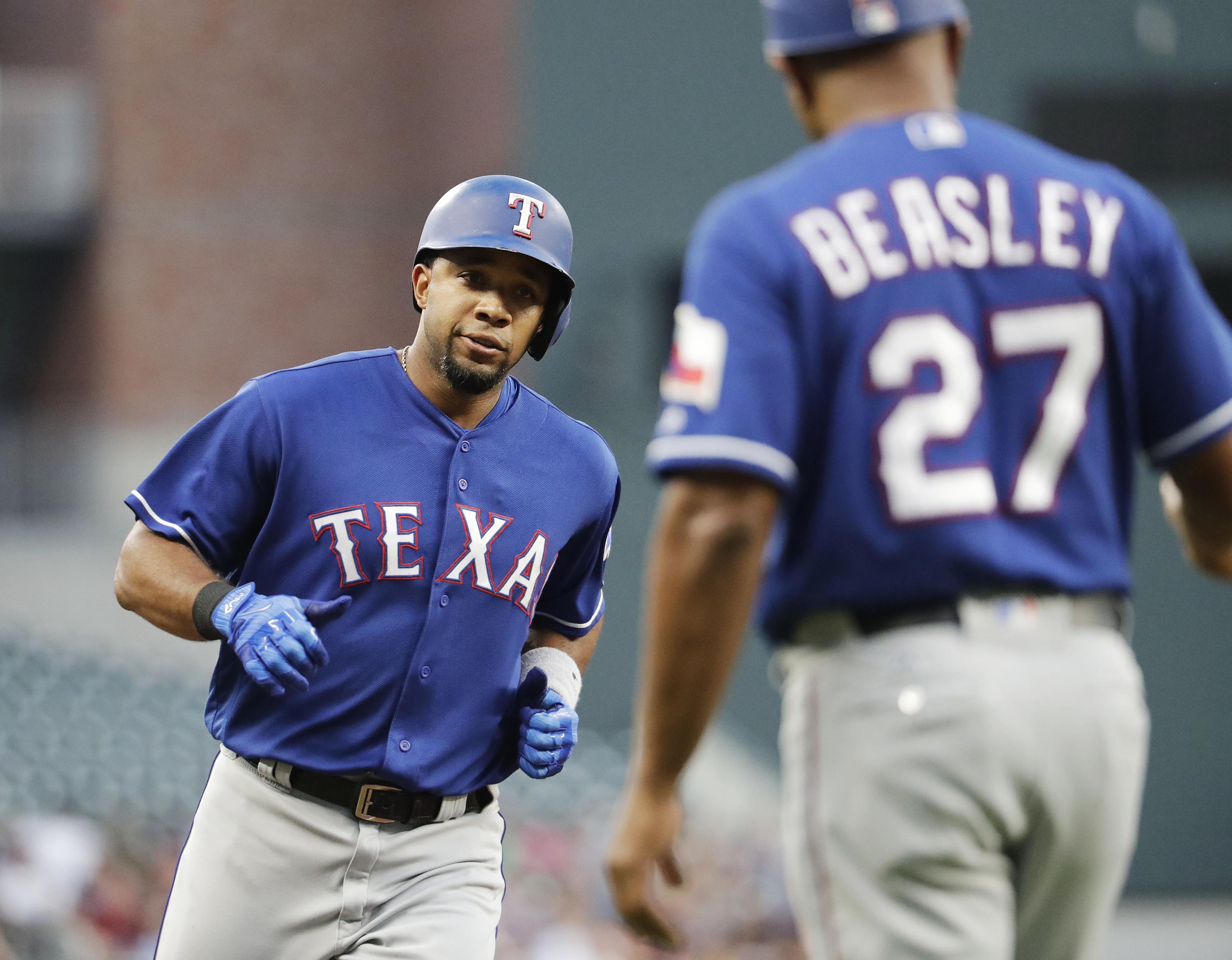 Homer-happy Rangers take easy win over Braves | AP News