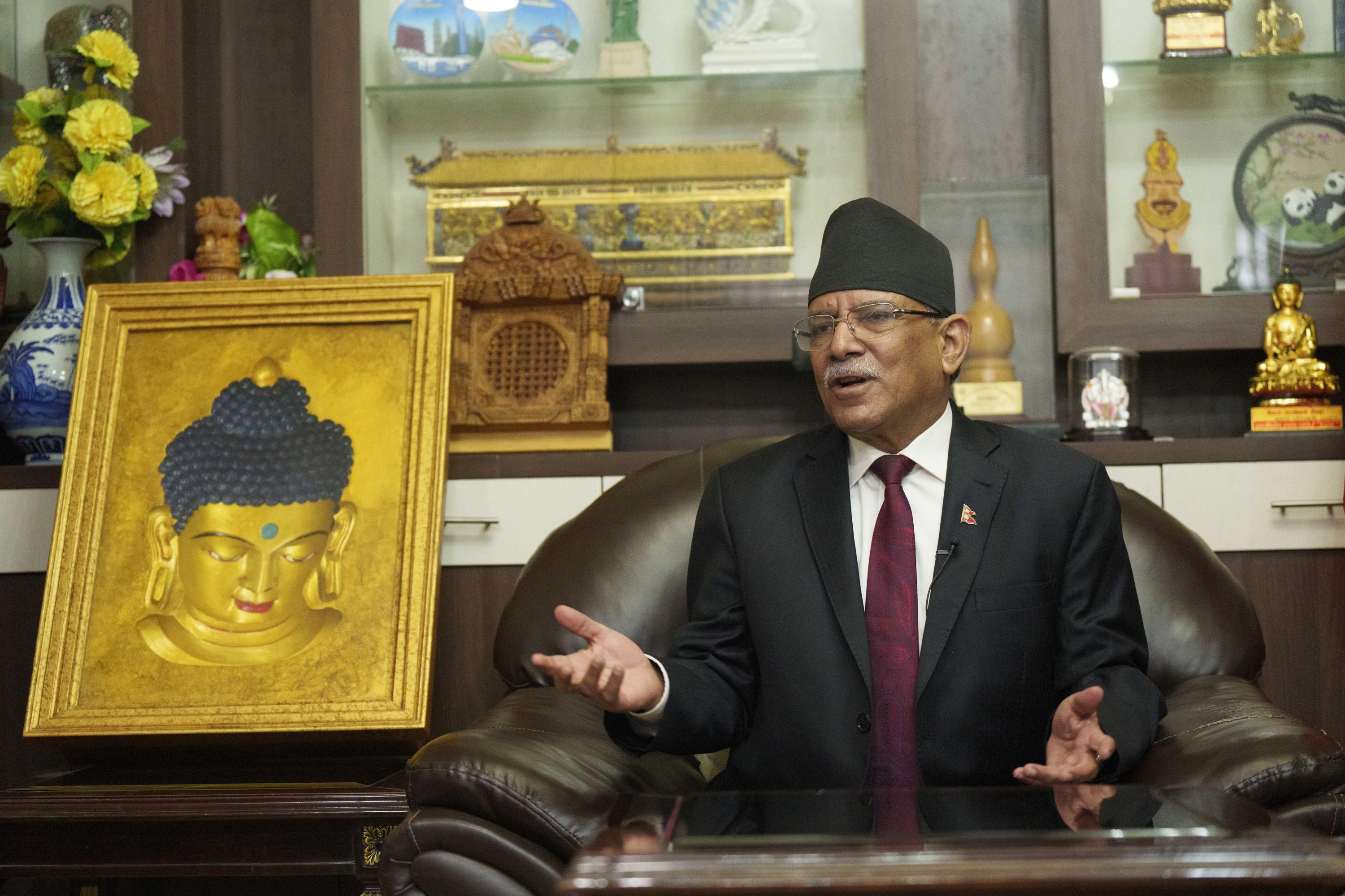 Ex-communist rebel leader pledges stable government in Nepal | AP News