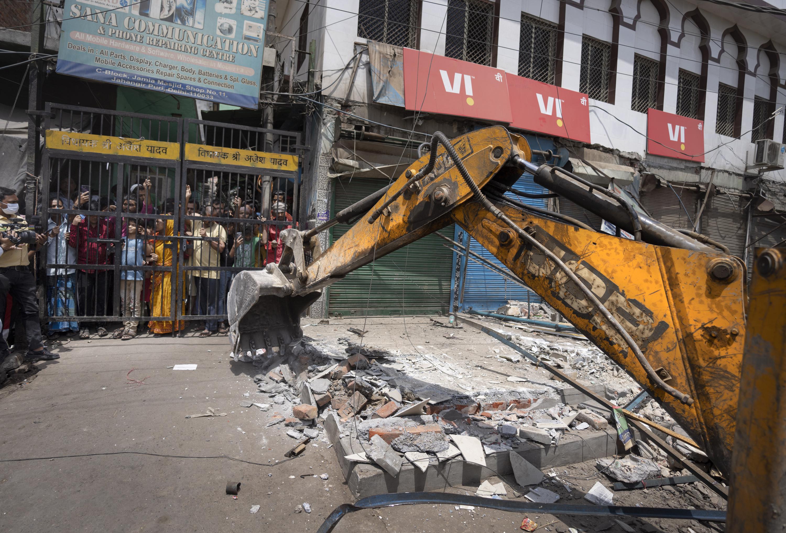 Muslim properties razed in New Delhi after communal violence | AP News