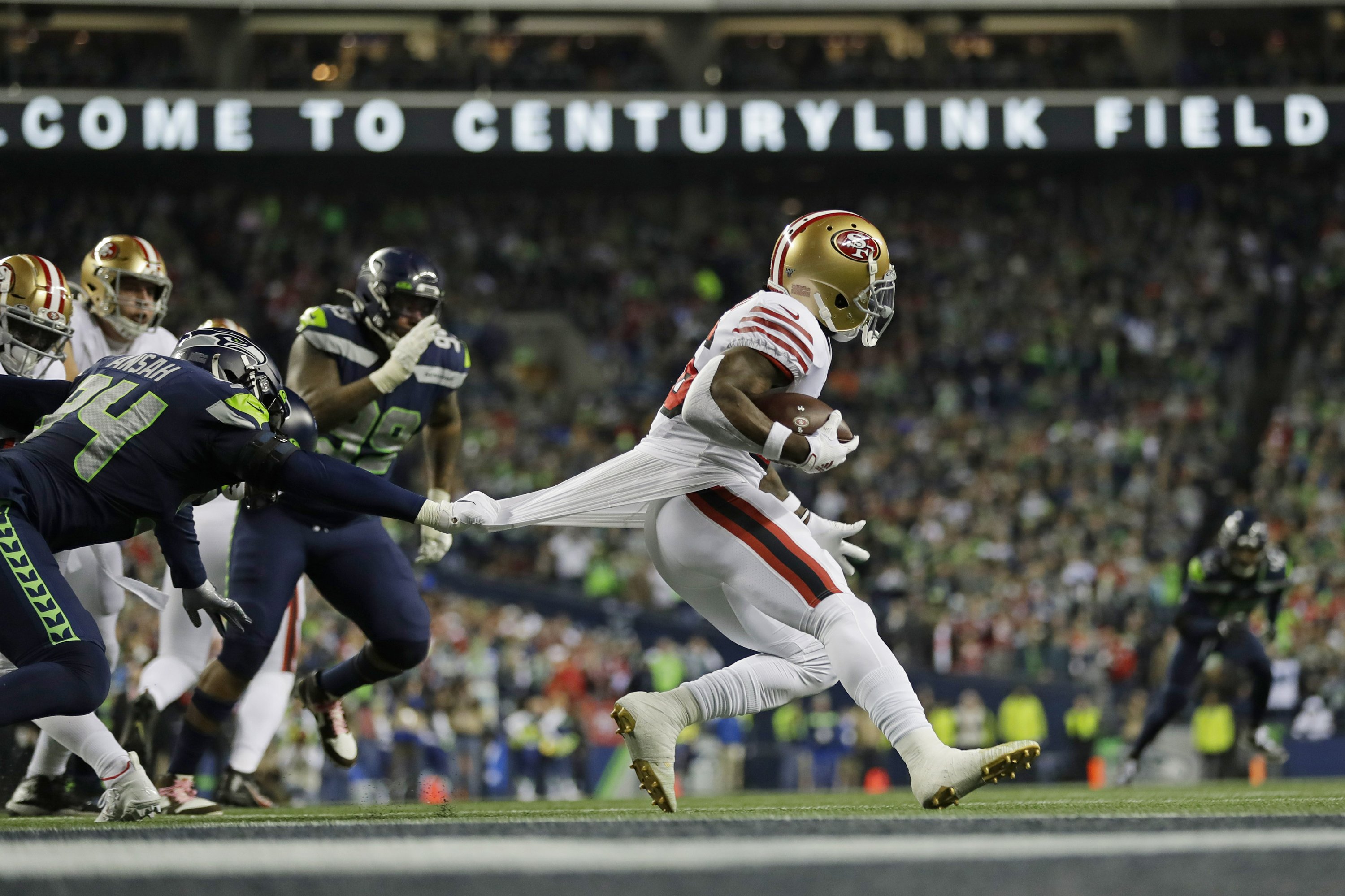 49ers go from No. 2 pick to No. 1 seed in 1 year | AP News
