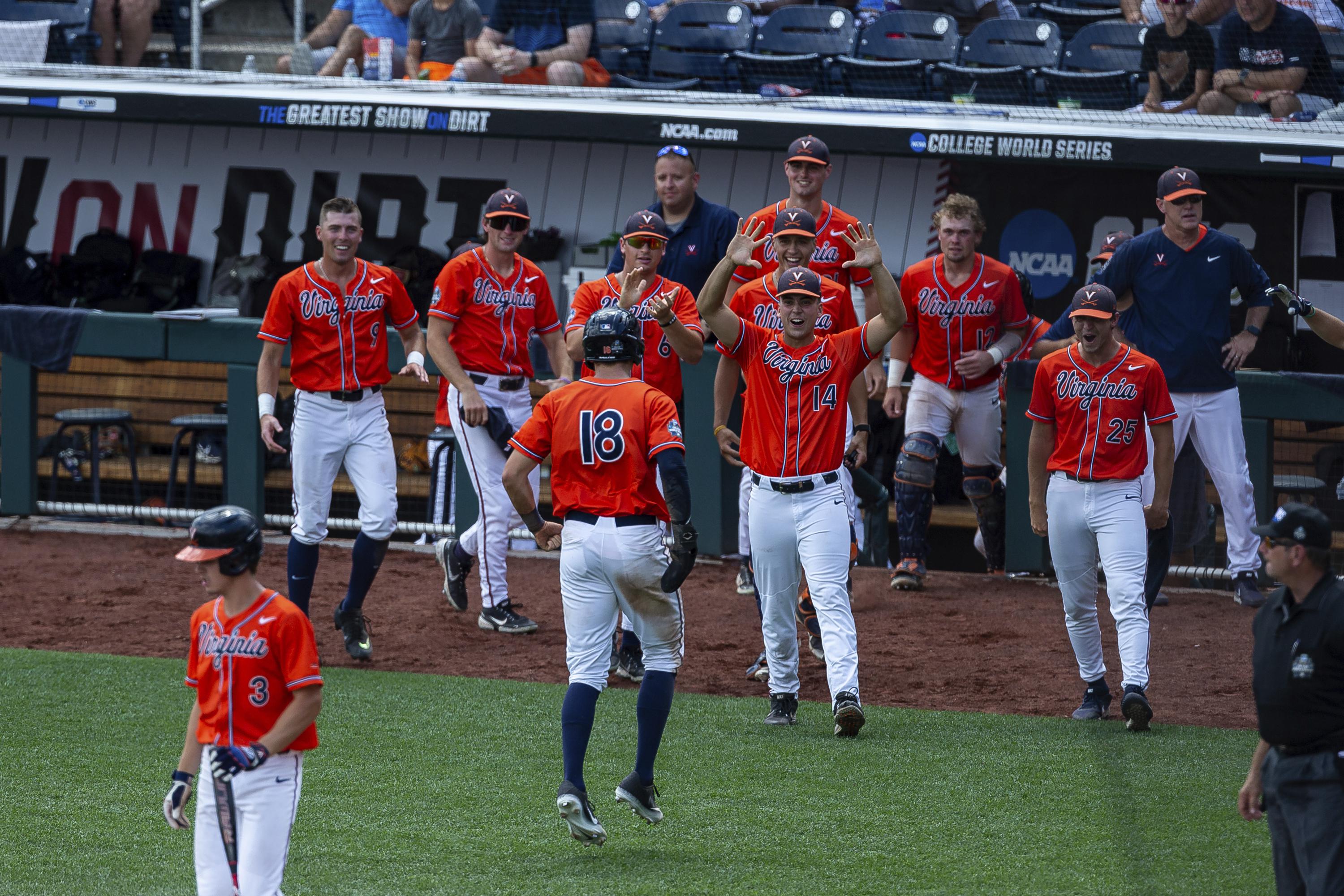 Michaels, Abbott lead Virginia past Vols 6-0 in CWS opener | AP News