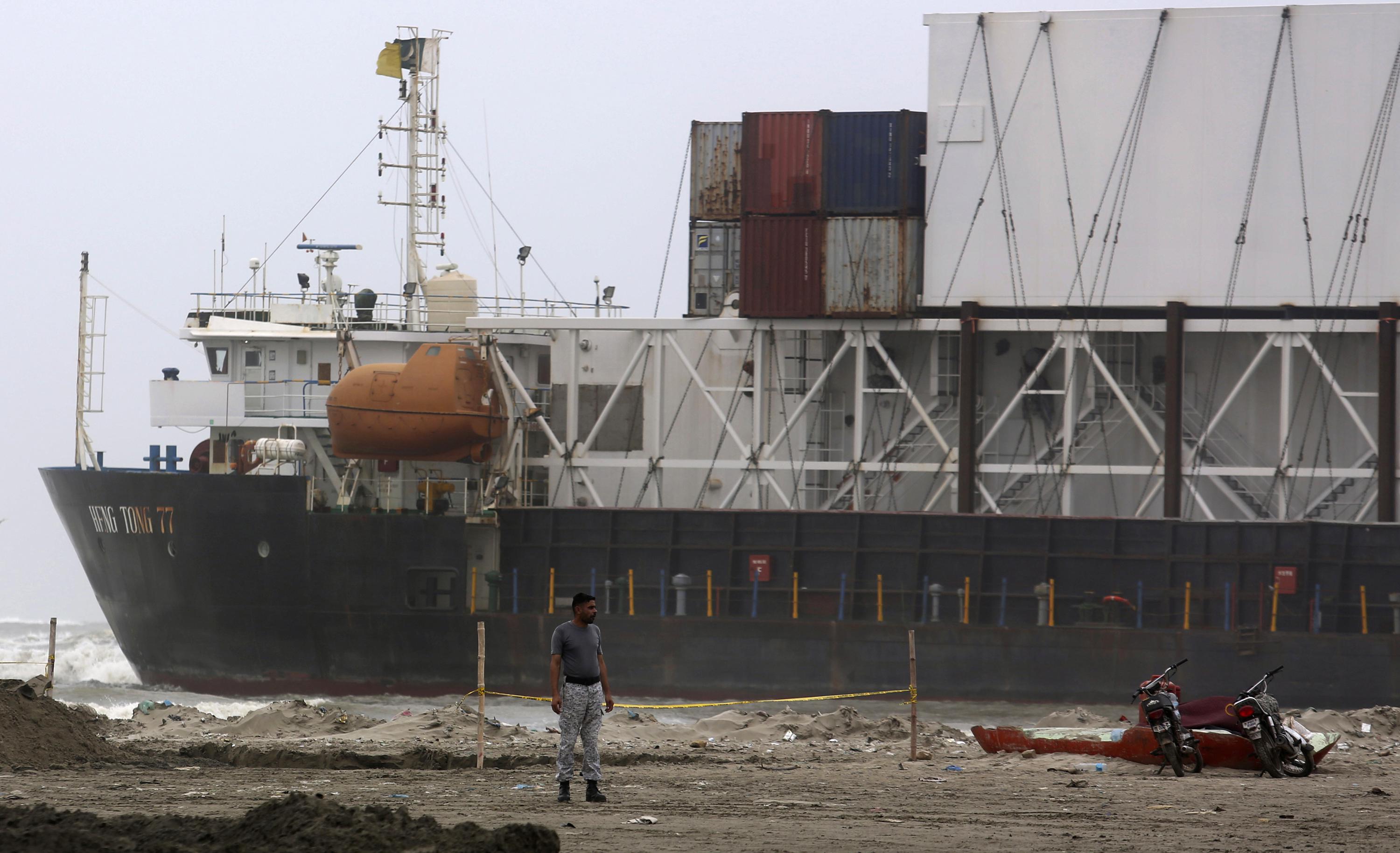 Pakistan plans to refloat ship that ran aground near Karachi | AP News