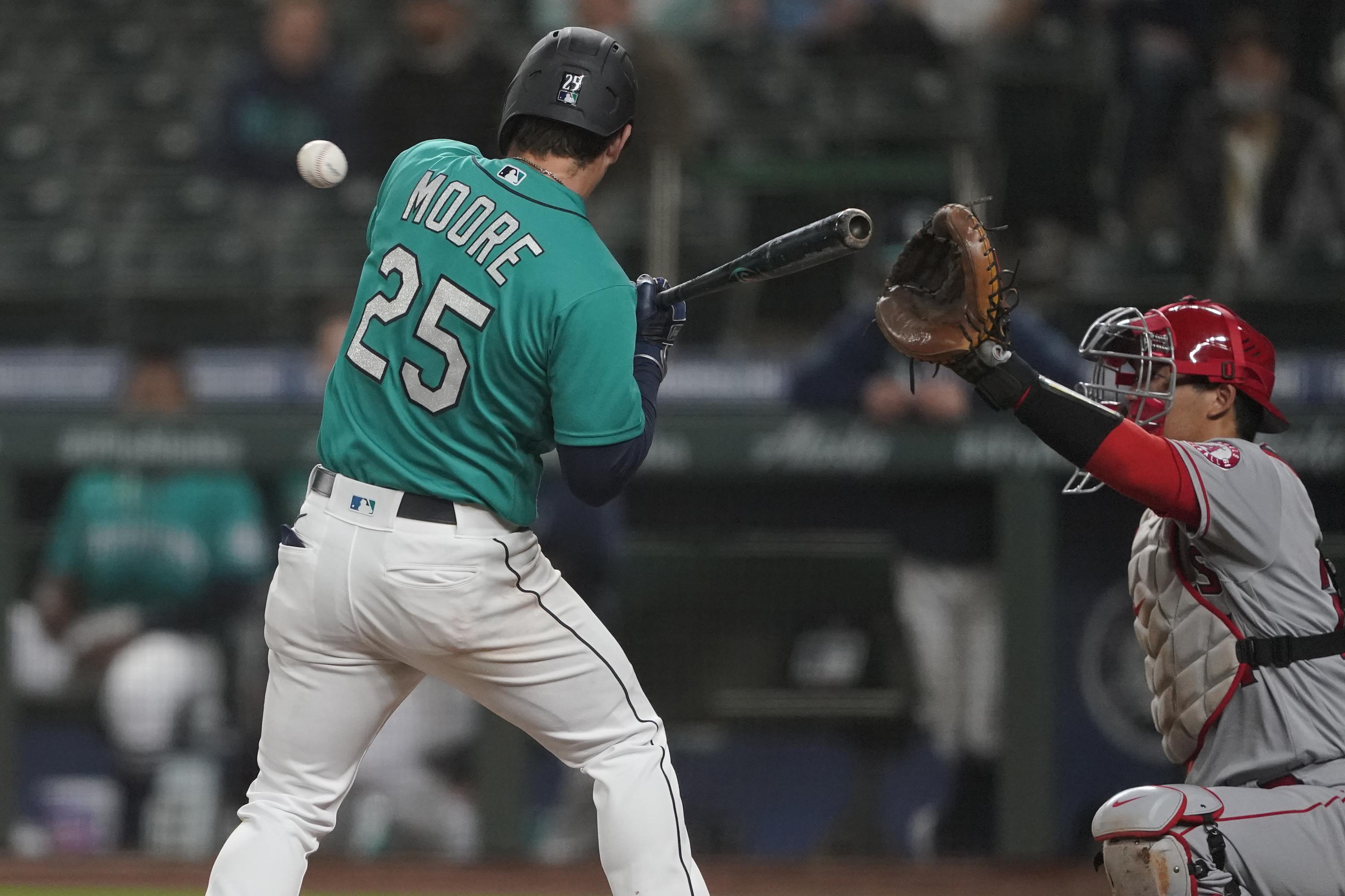 Moore, bullpen drive Mariners' 7-4 win over Angels | AP News