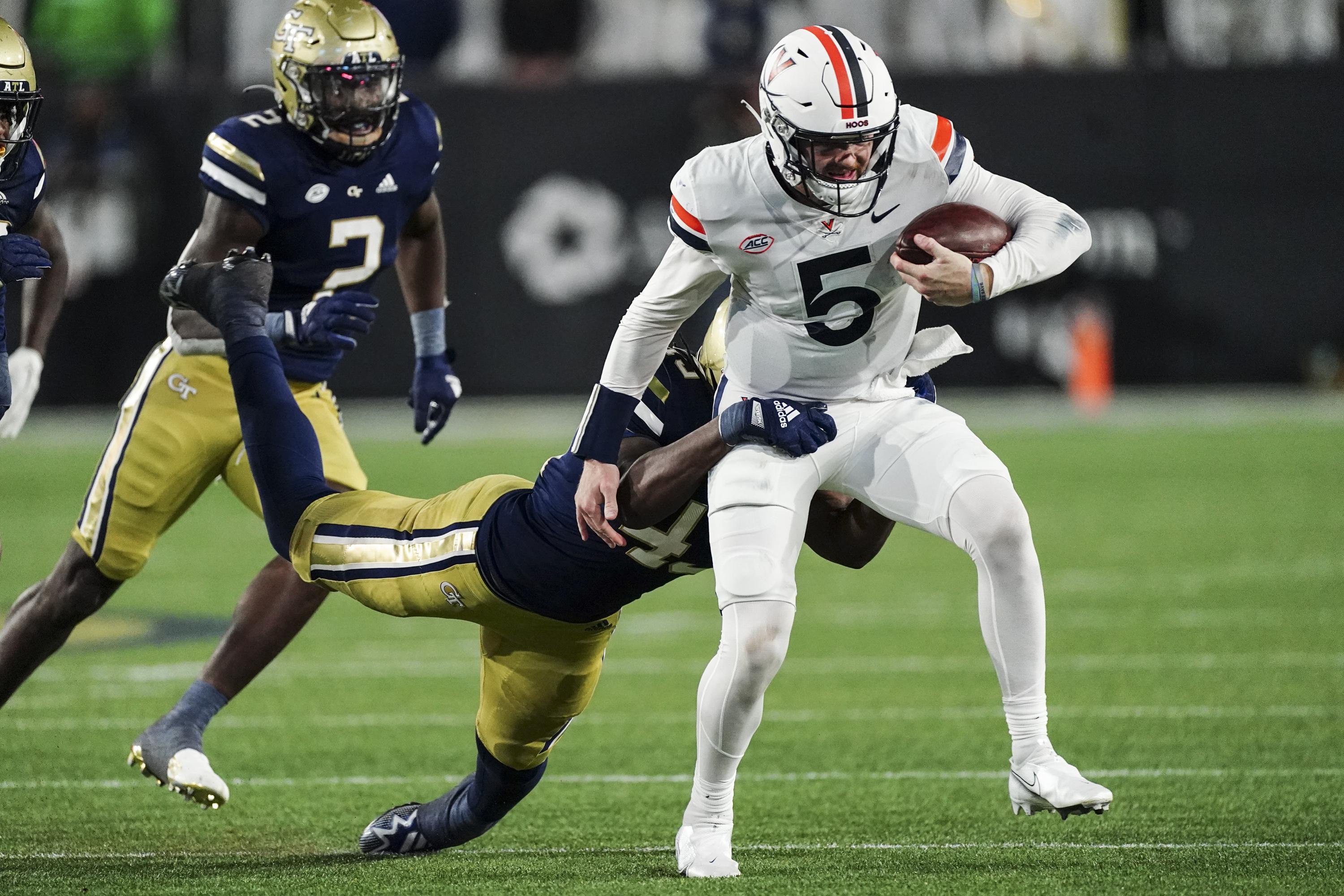 Armstrong just good enough in Virginia's win over Jackets | AP News