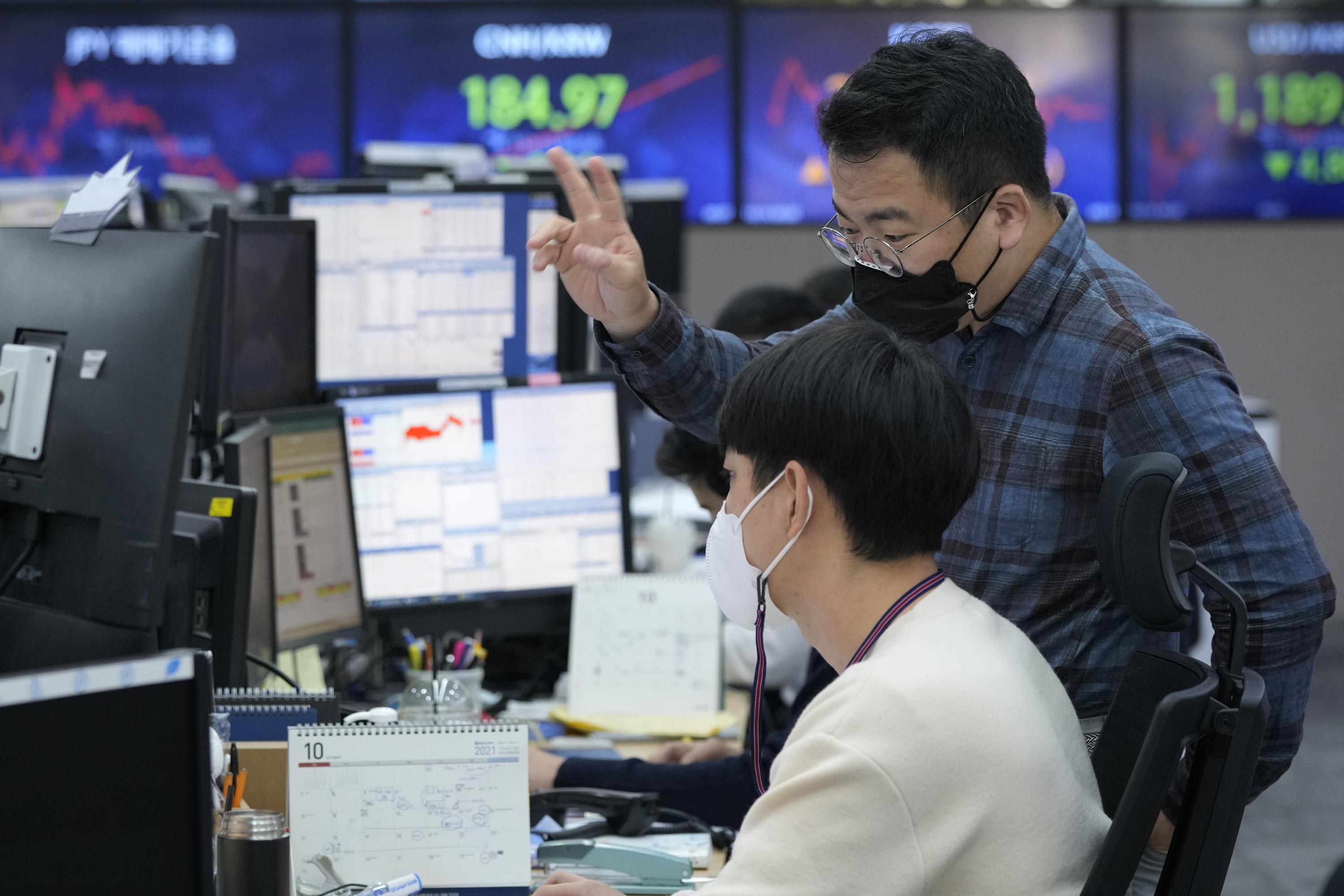 Asian shares rise as Wall Street tech gain boosts optimism | AP News