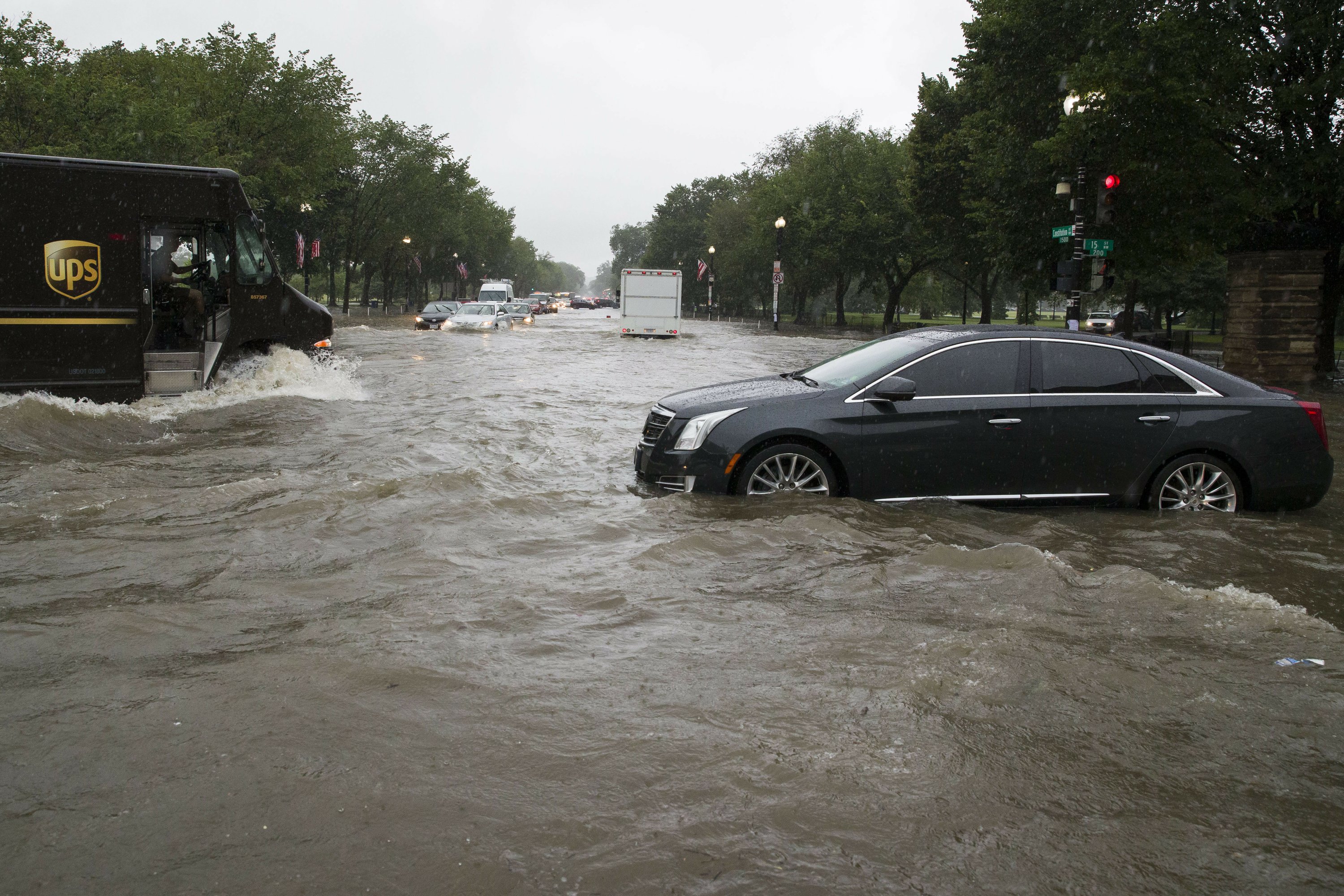 Rains strand Washington drivers, flood White House basement | AP News