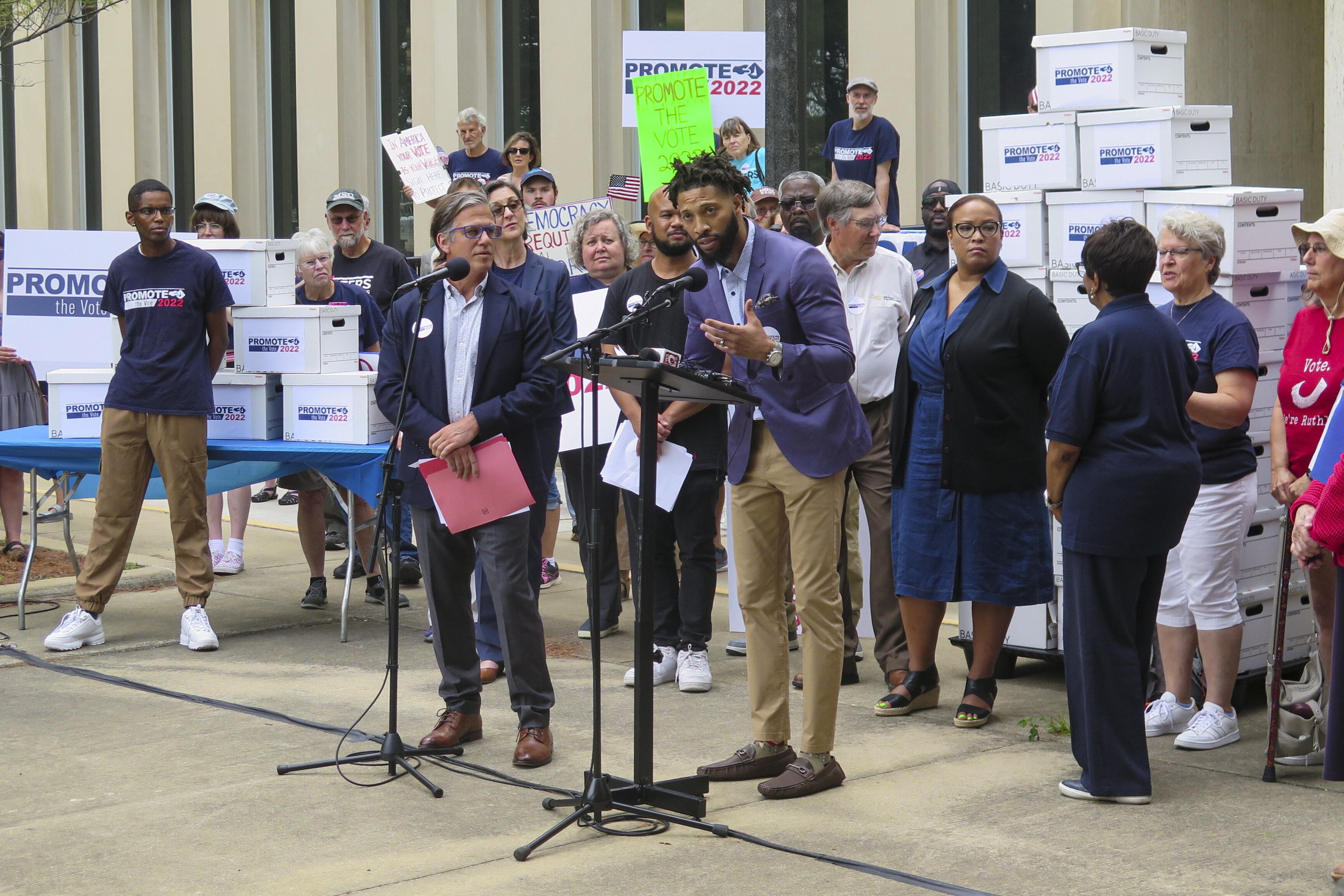 Court: Michigan voters may decide on expanding voting access | AP News