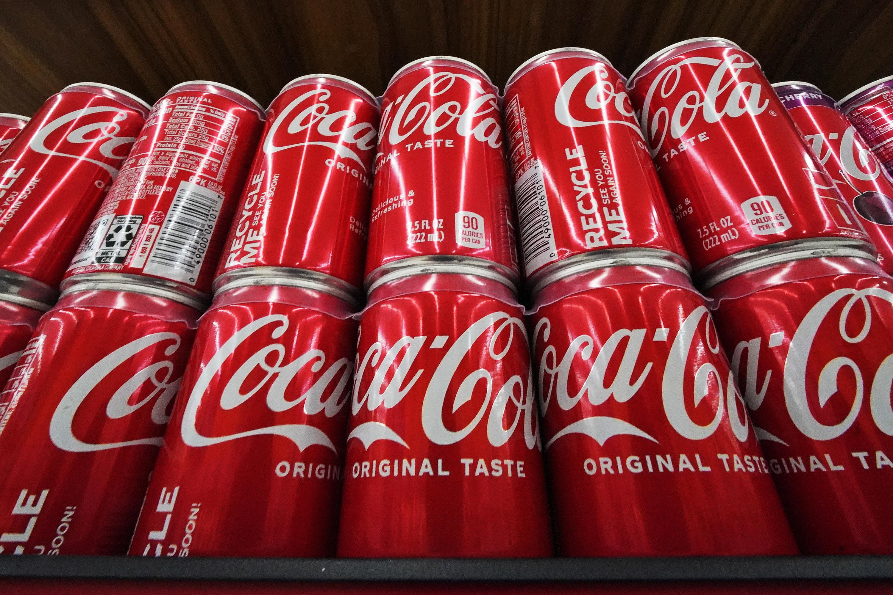 Coke revenue rises along with prices; ups outlook for 2022 | AP News