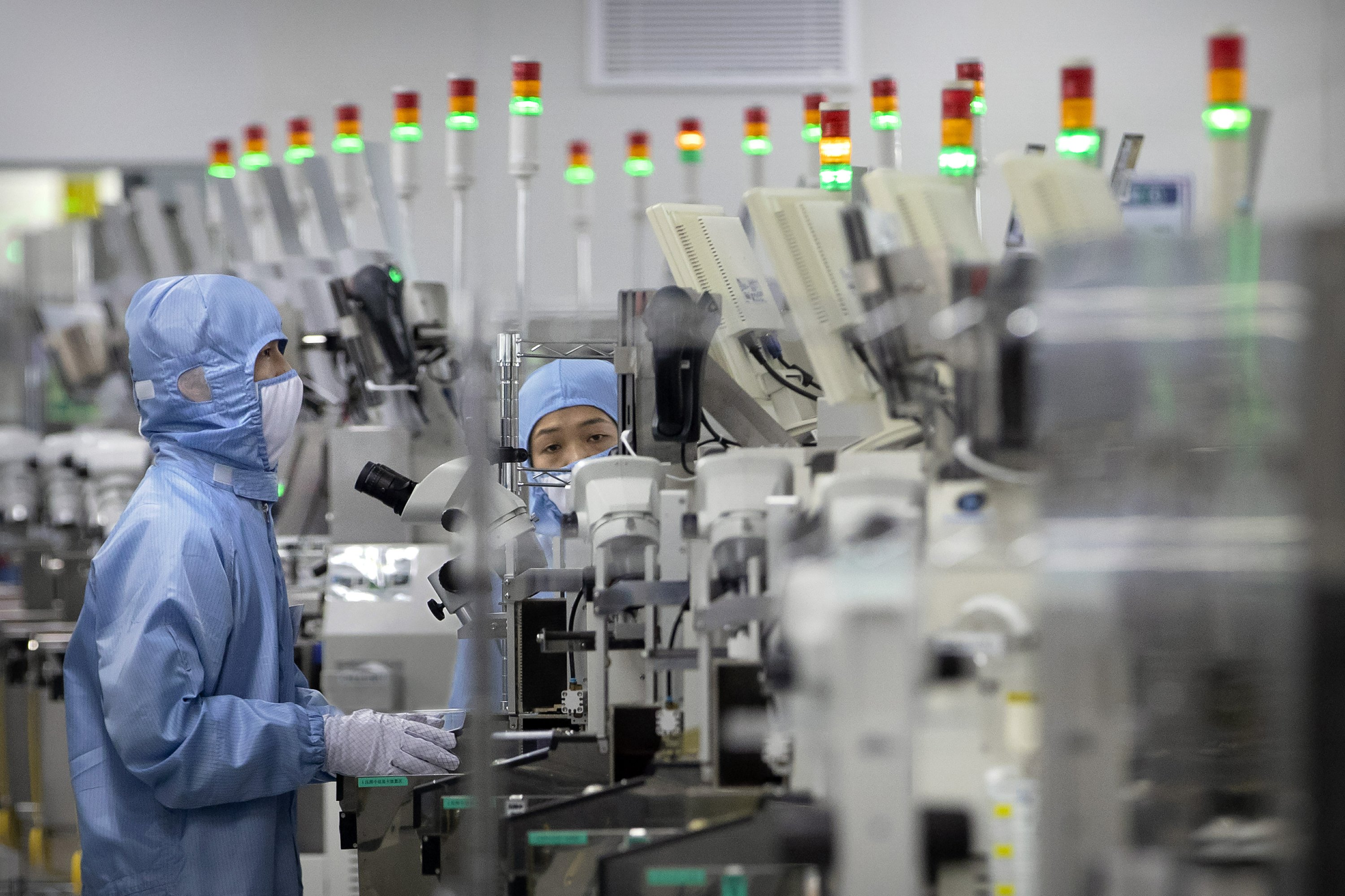 China cuts taxes to spur semiconductor development | AP News
