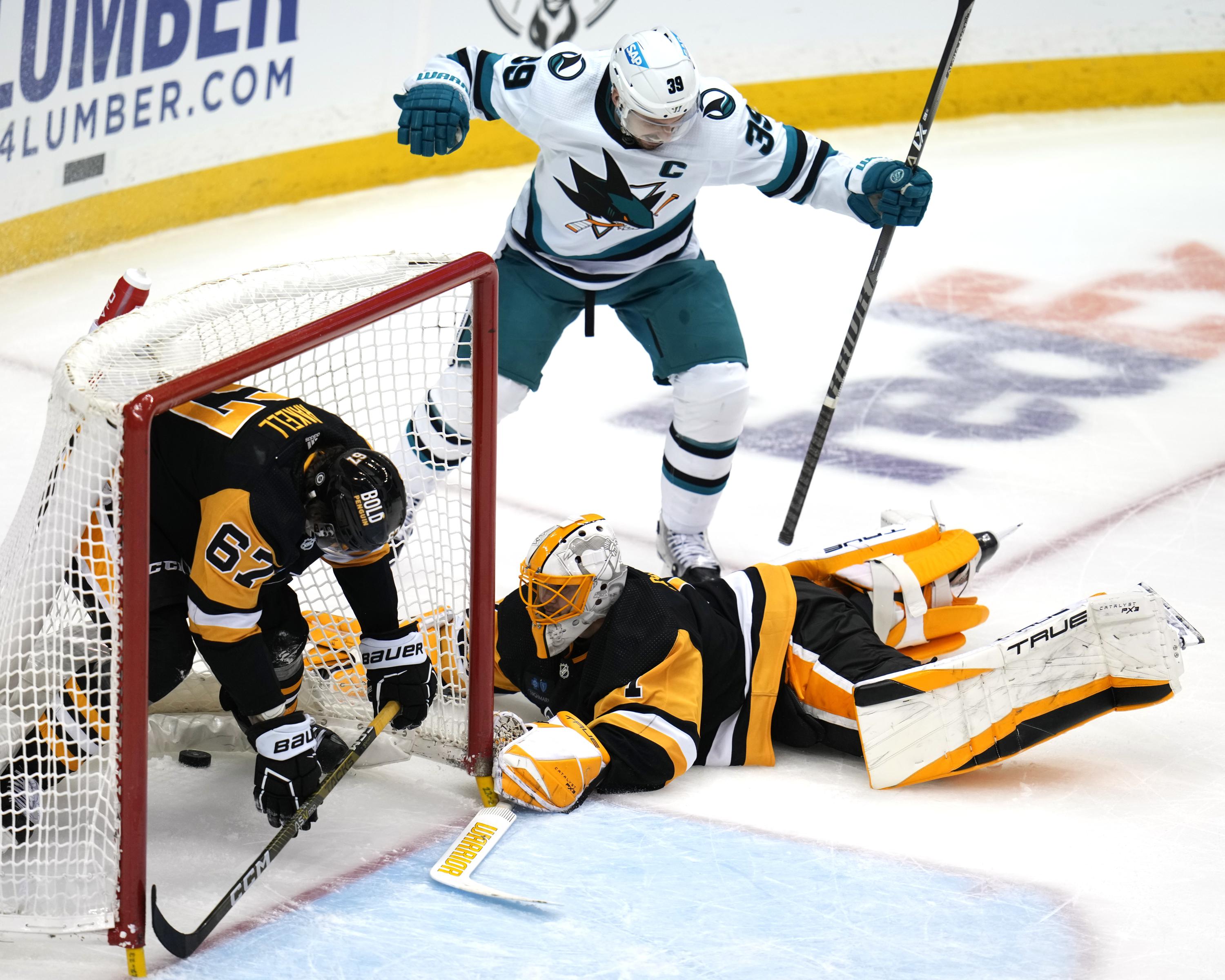 Couture leads Sharks past Penguins 6-4 to end four-game skid | AP News