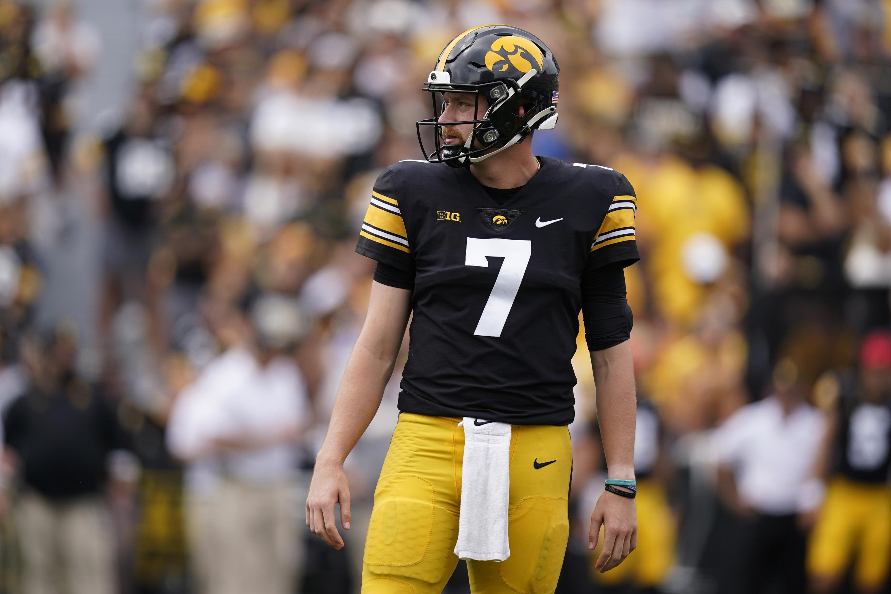 Vibe upbeat around Cyclones' QB, not so much around Iowa's | AP News