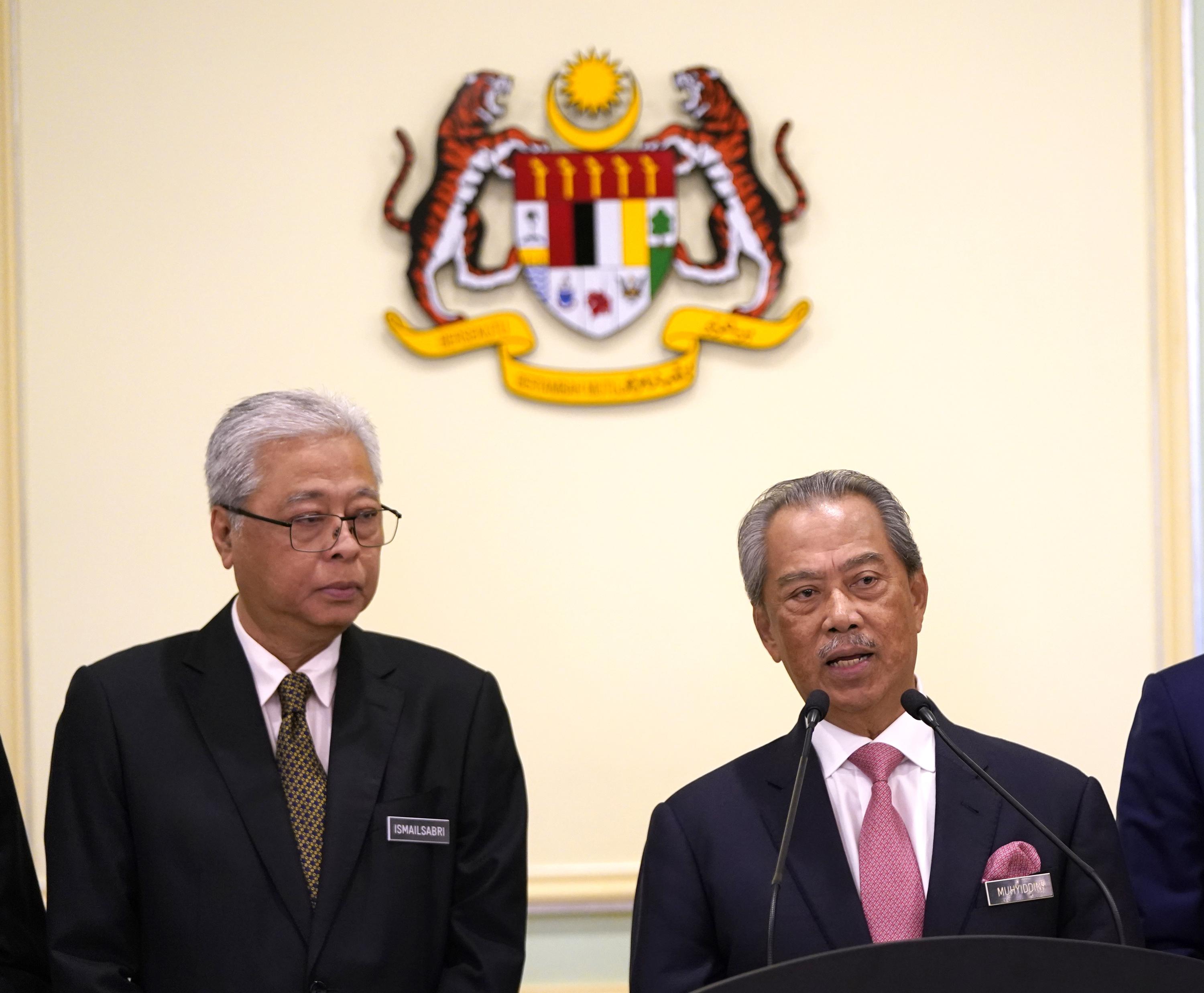 Malaysia's top lawyer: PM still in power after ally quits | AP News