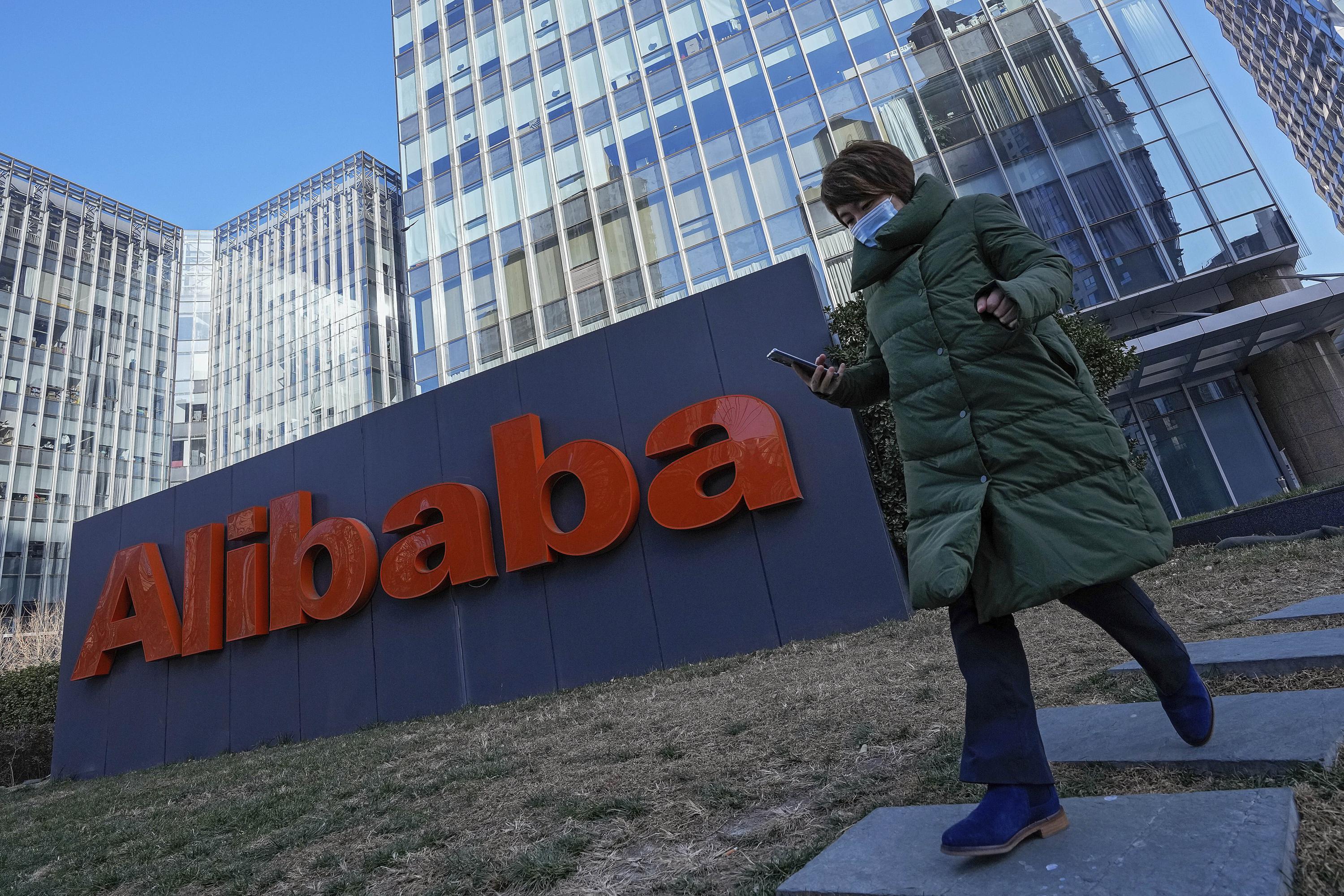 Alibaba reports slowest growth yet amid COVID-19 outbreaks | AP News