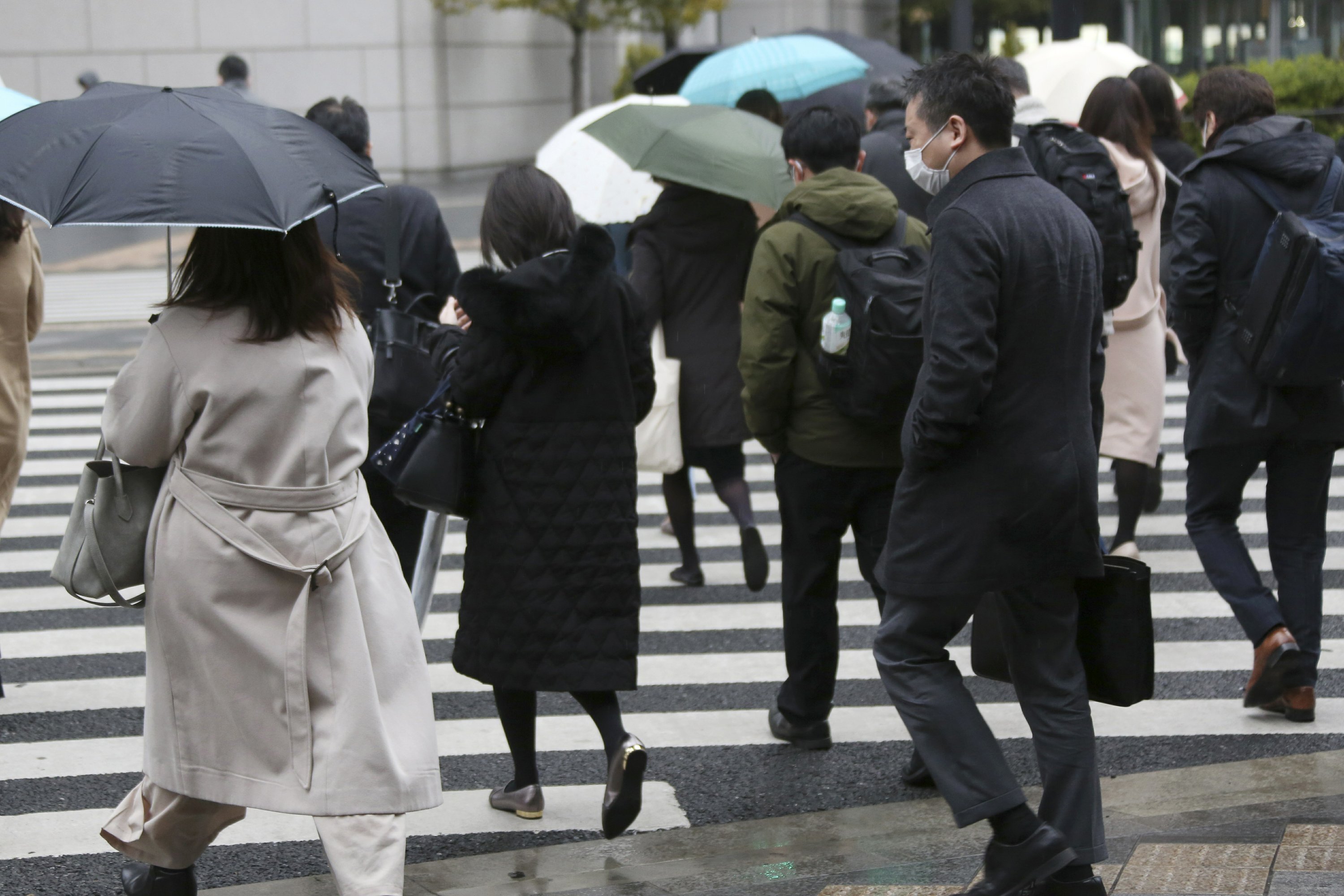 Japanese economy sees recovery from pandemic slump | AP News