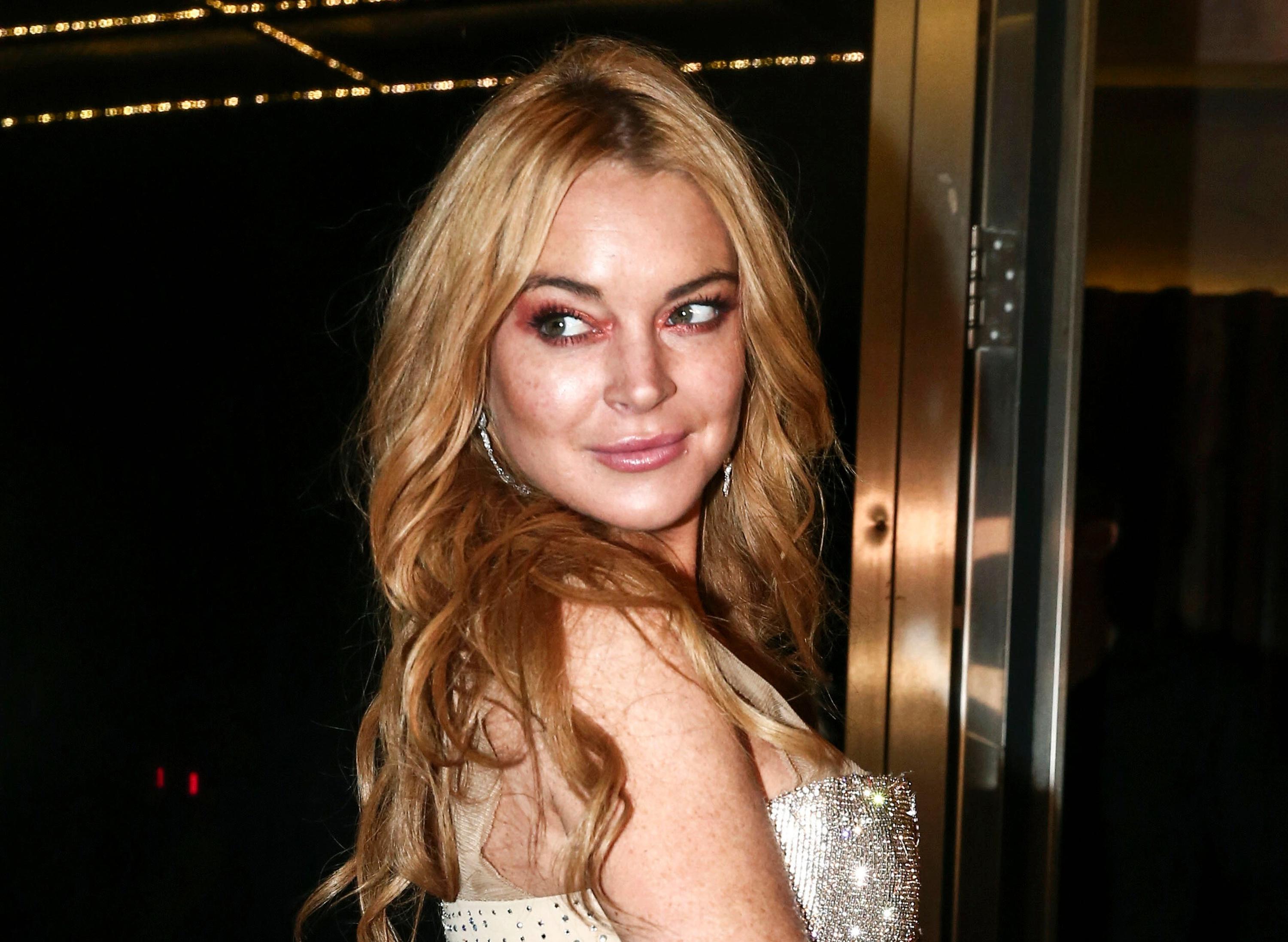 Actress Lindsay Lohan announces engagement in Instagram post | AP News