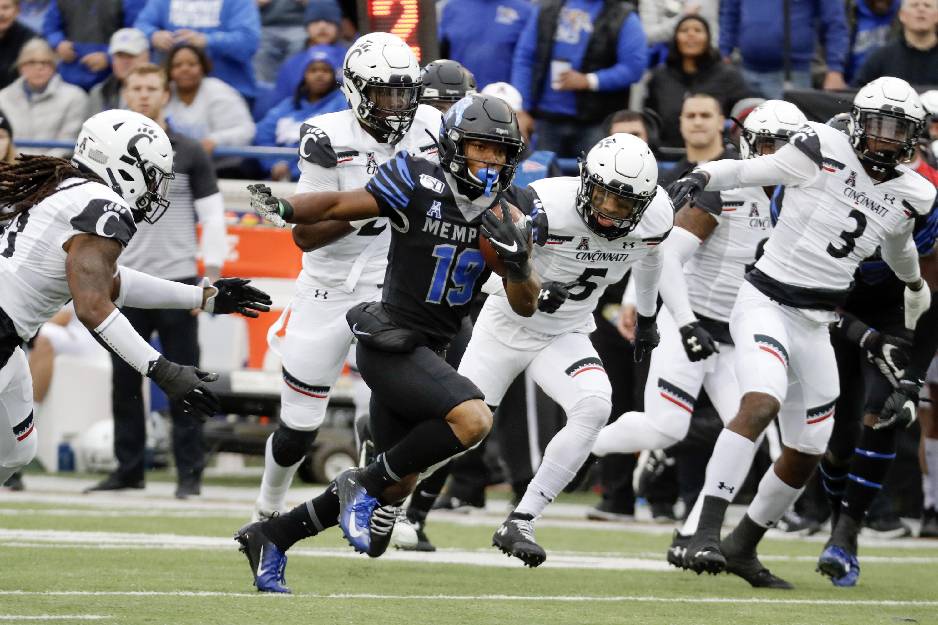 Memphis running back ready for NFL draft after opting out | AP News