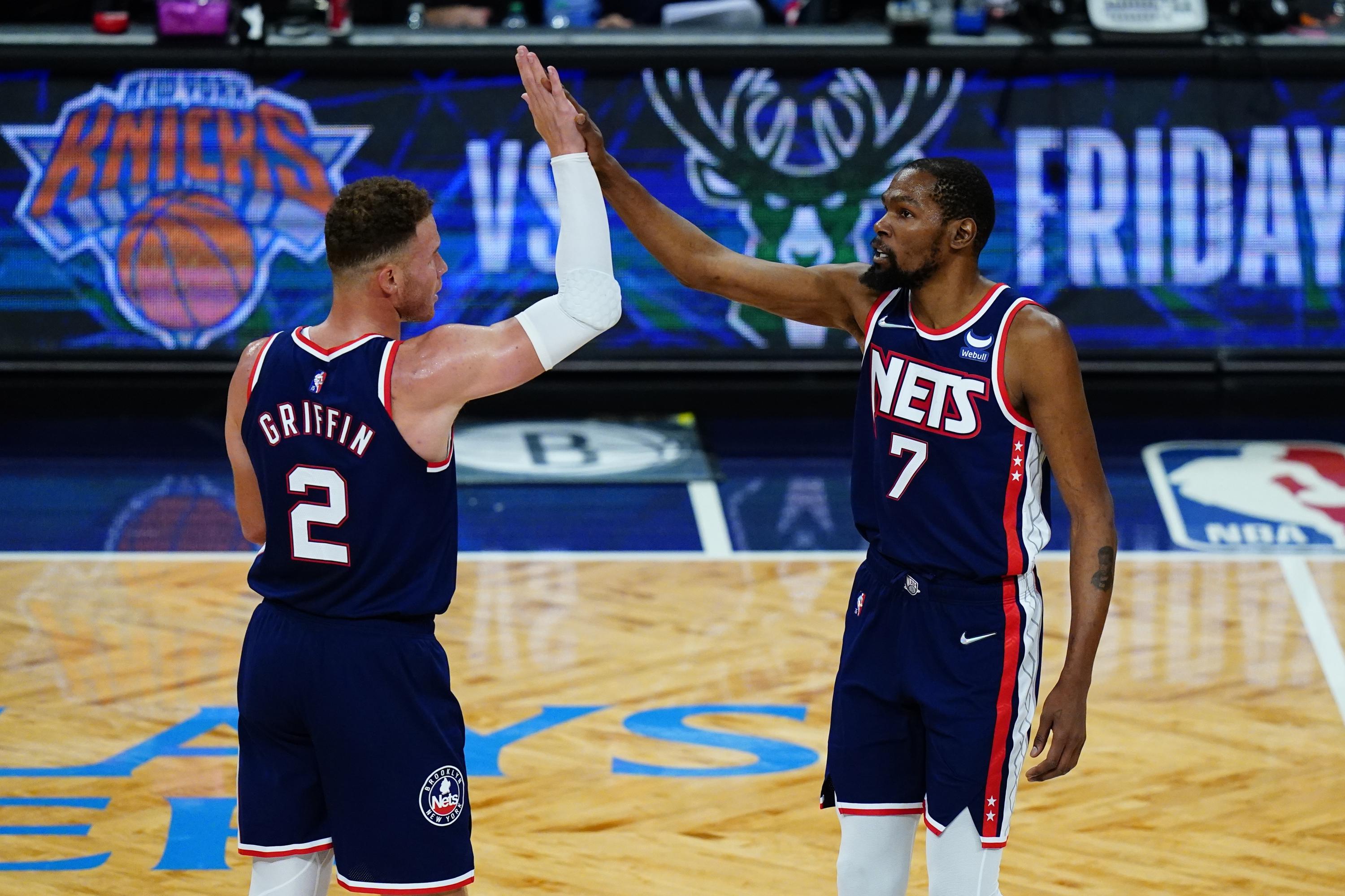 Kevin Durant scores 32 points, Nets beat Hawks 117-108 | AP News