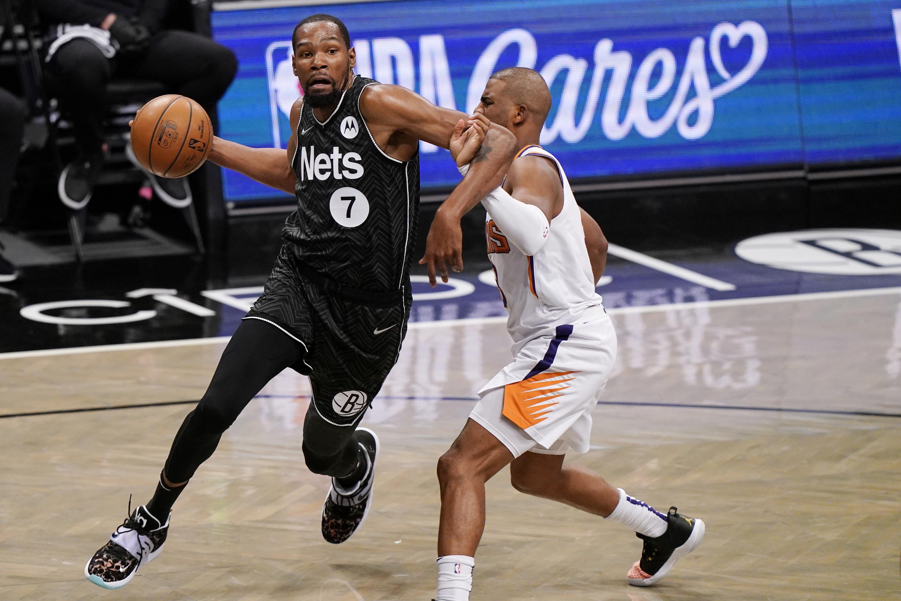 Durant regresa con 33 puntos y Nets vencen 128-119 a Suns | AP News
