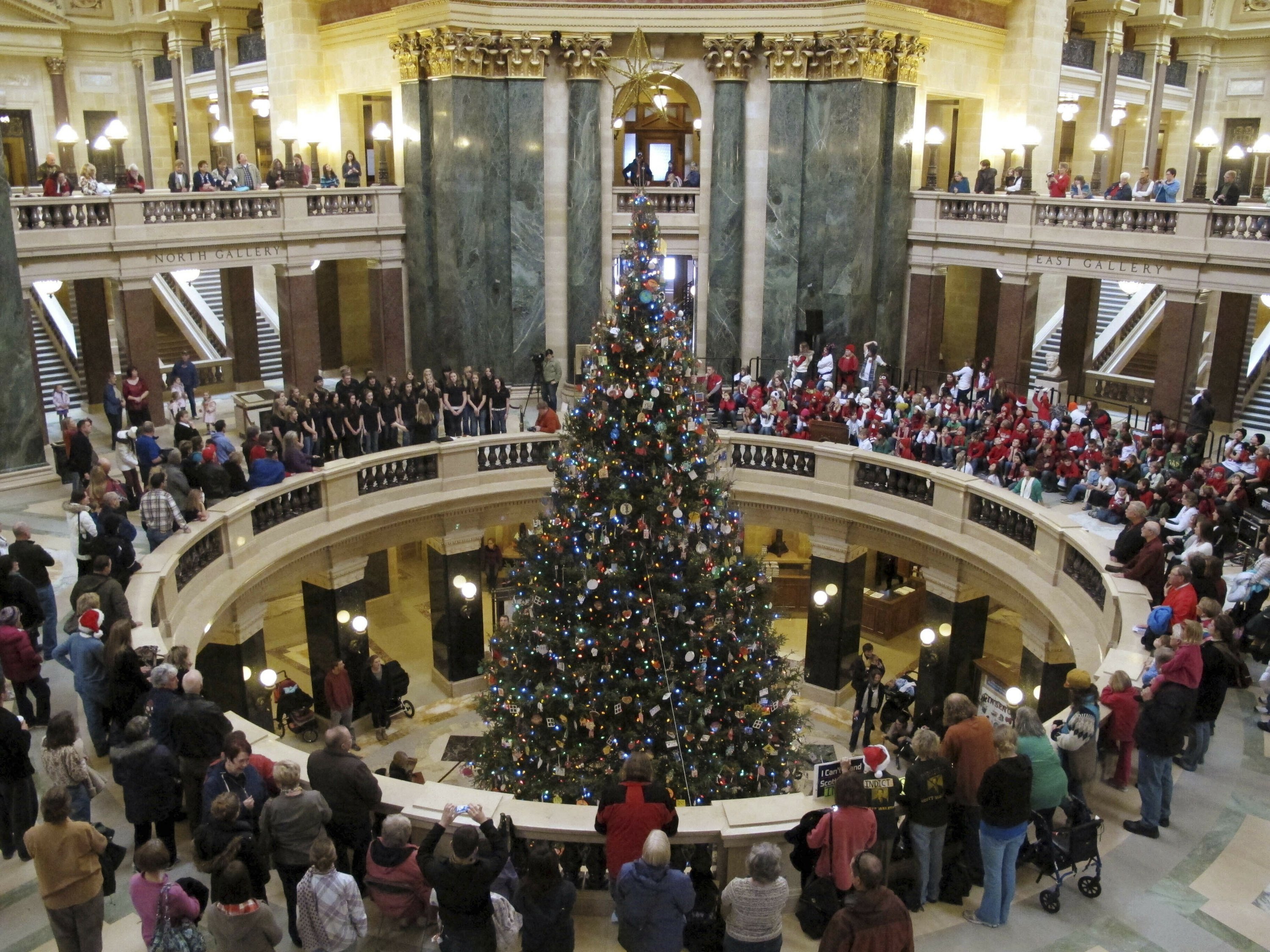 Wisconsin governor returns 'holiday tree' name to evergreen | AP News