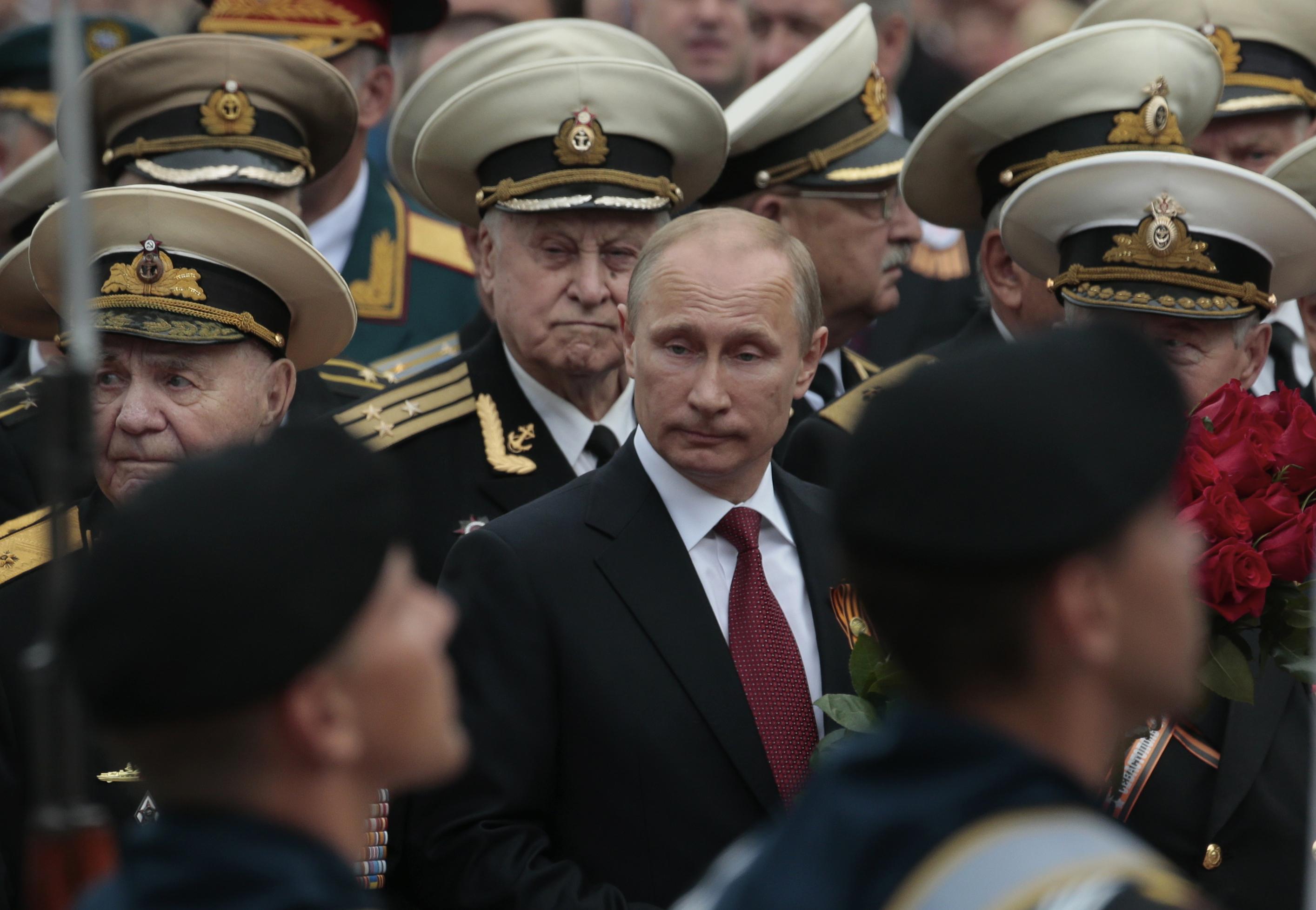Putin hails 'return' of Crimea; fighting kills 7 | AP News