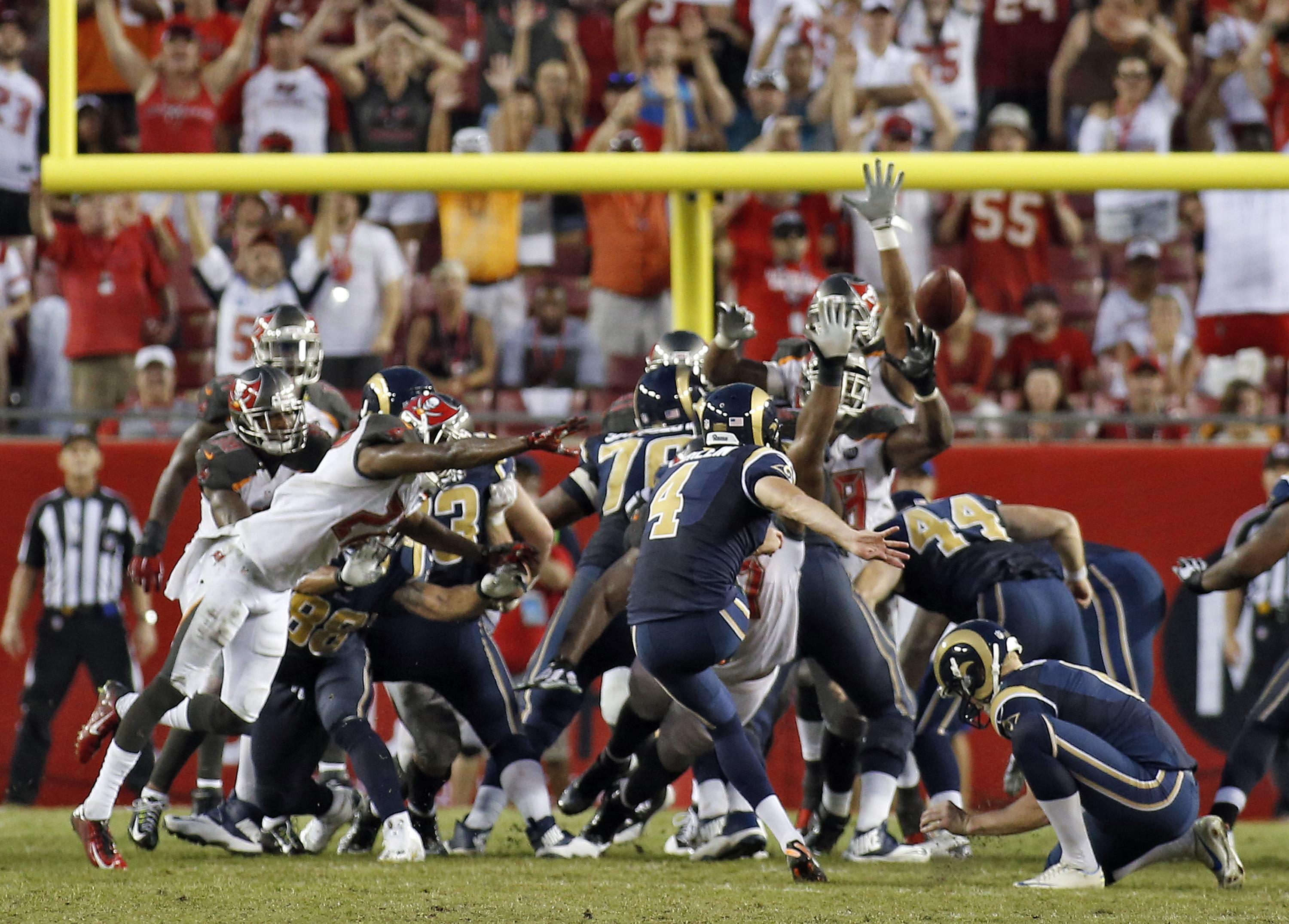 Davis leads Rams over Buccaneers in 1st NFL start | AP News
