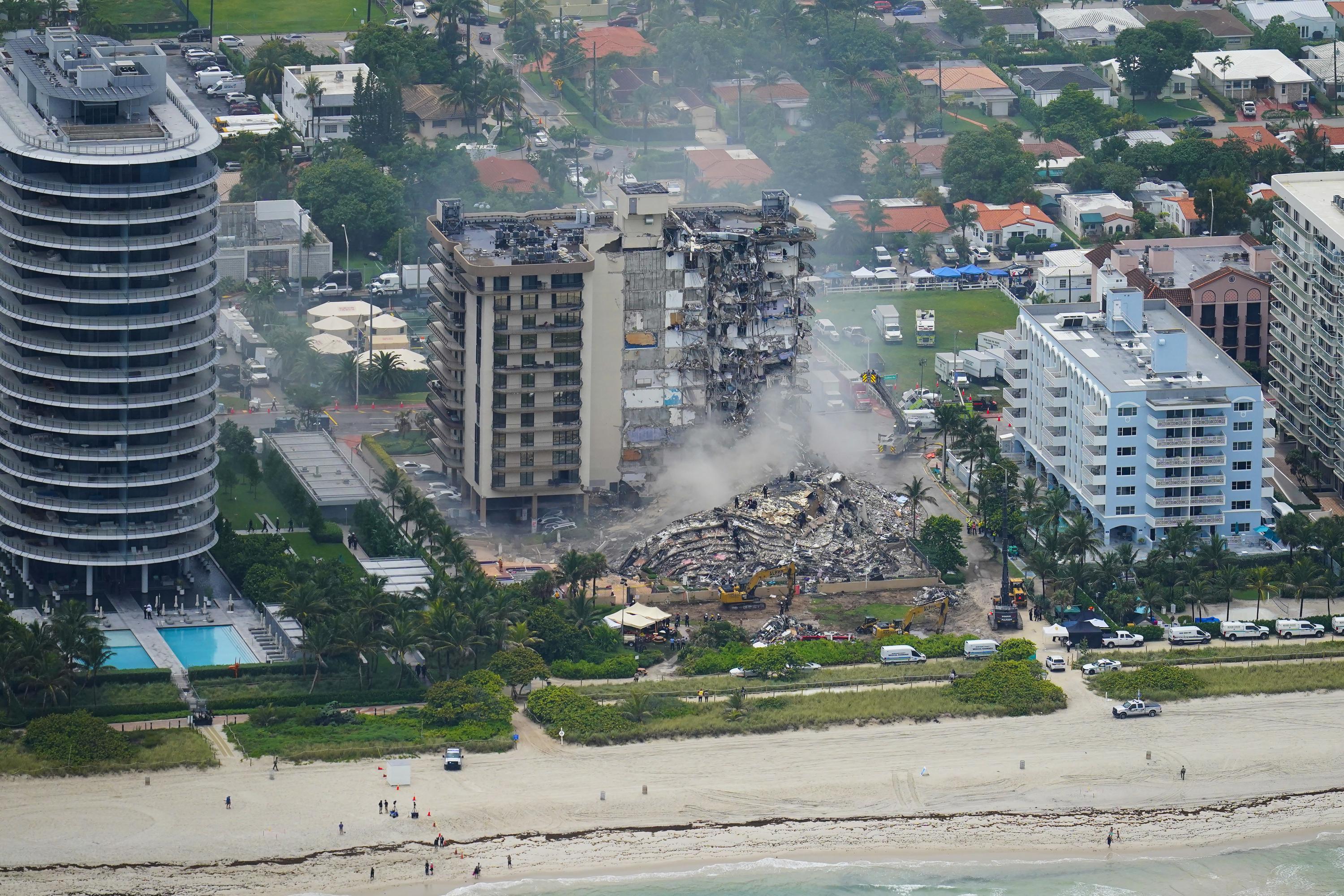 Surfside condo's sister building gets structural supports | AP News