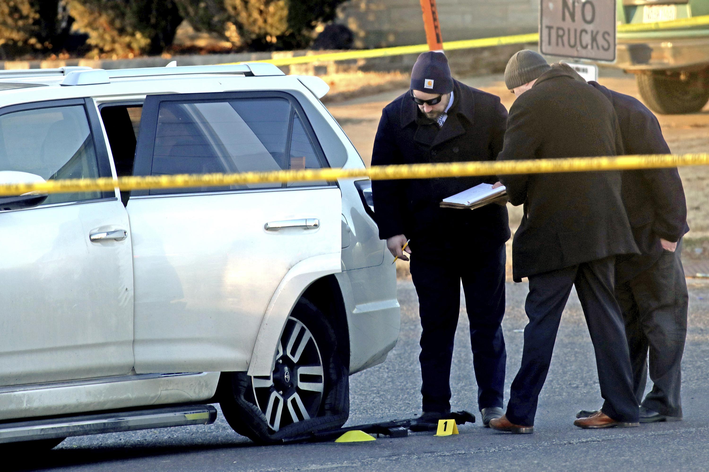 Two men charged in shooting that wounded St. Louis officers | AP News