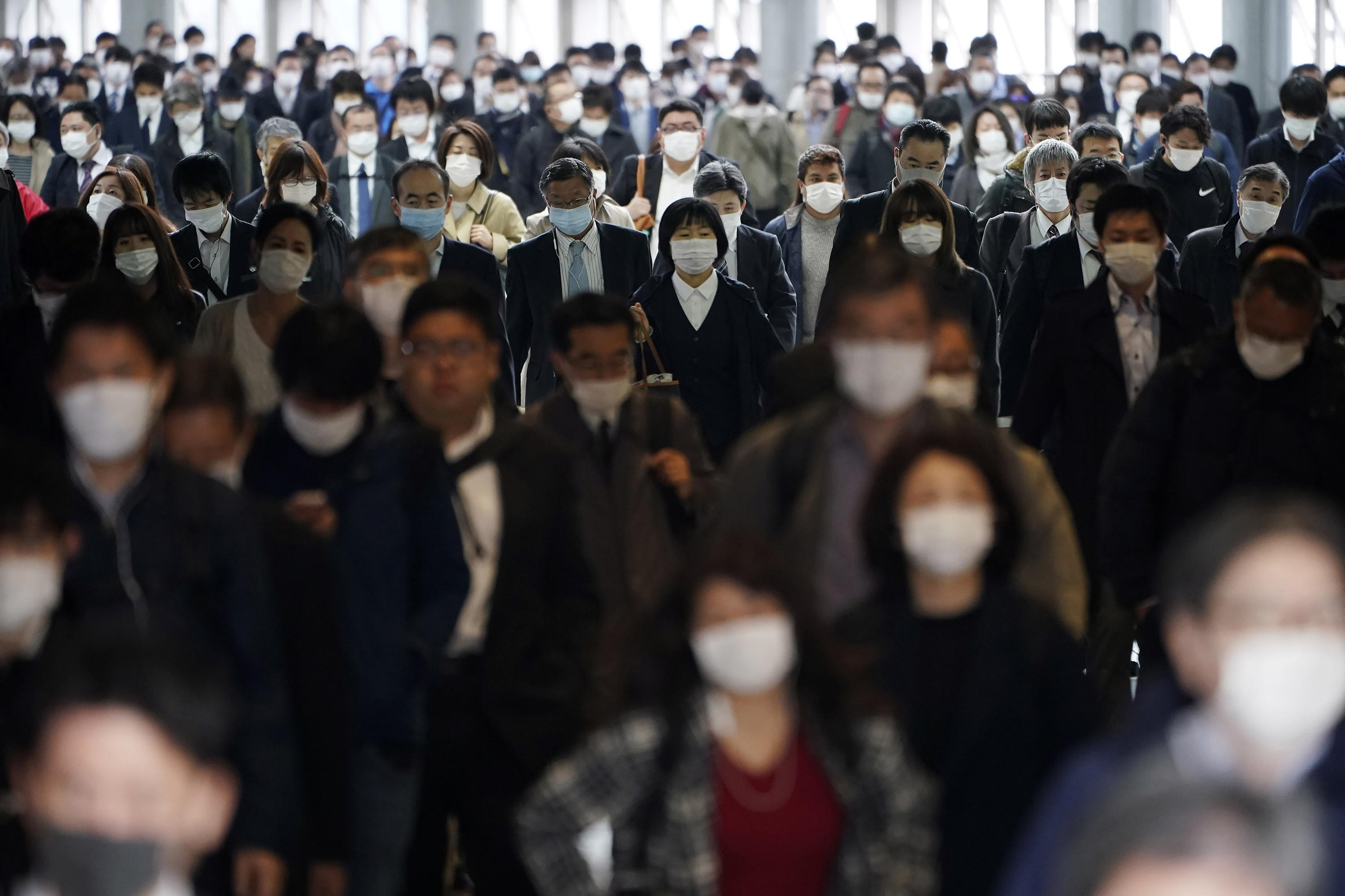 Japan OKs $216B extra budget to counter impact of inflation | AP News