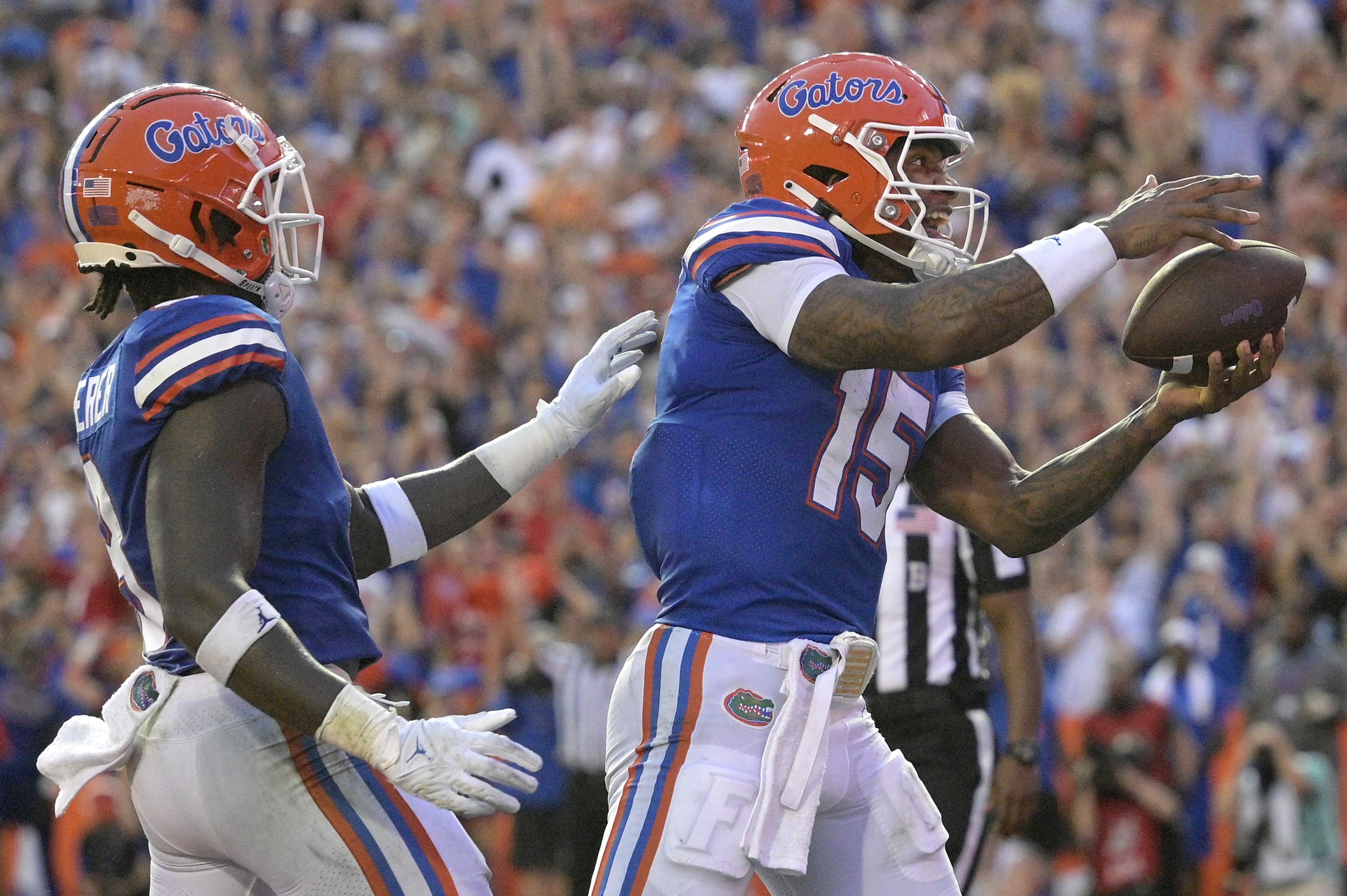 Florida hosts Kentucky, hopes to prove opener was no fluke | AP News