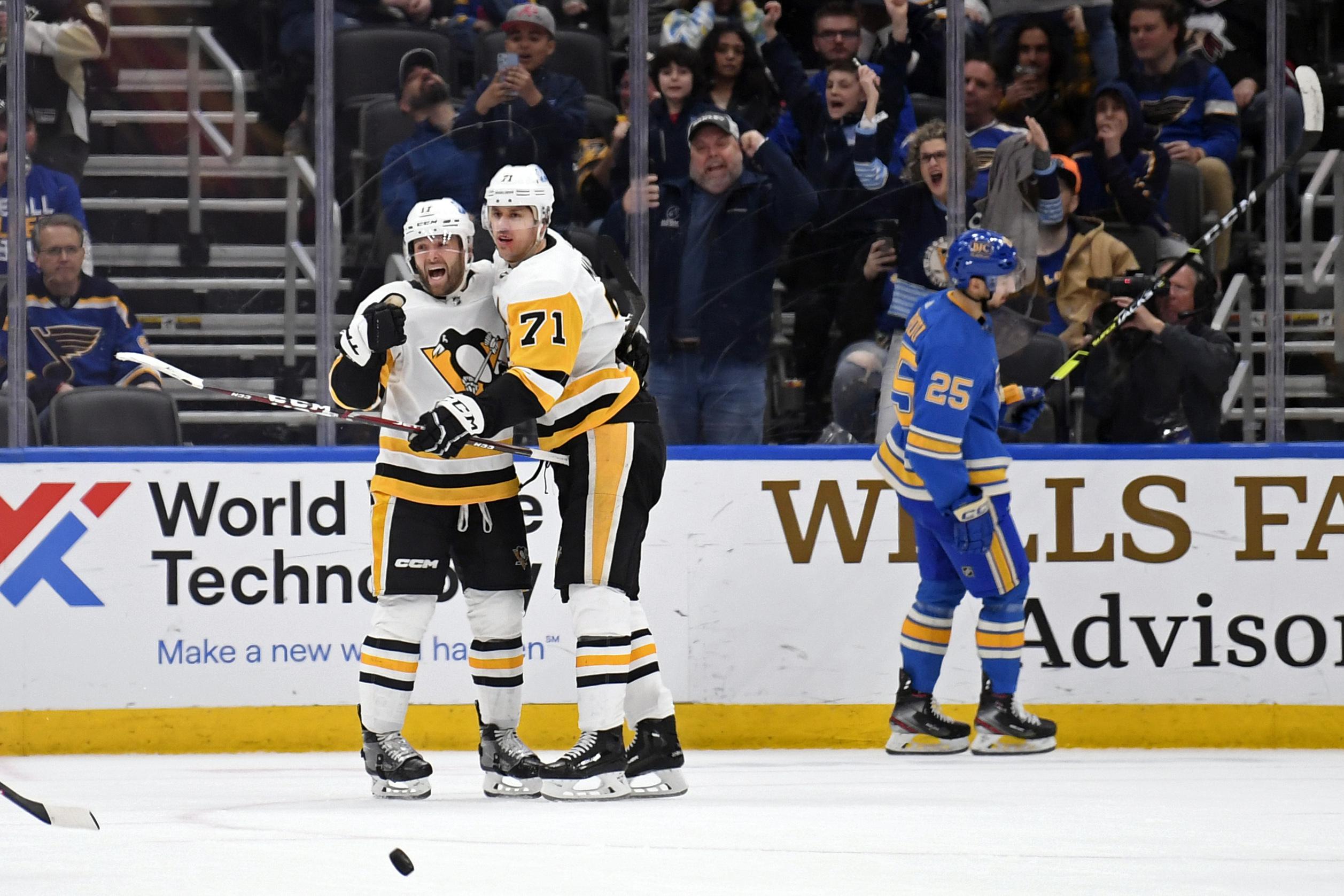 Rust's overtime goal lifts Penguins to 3-2 win over Blues | AP News