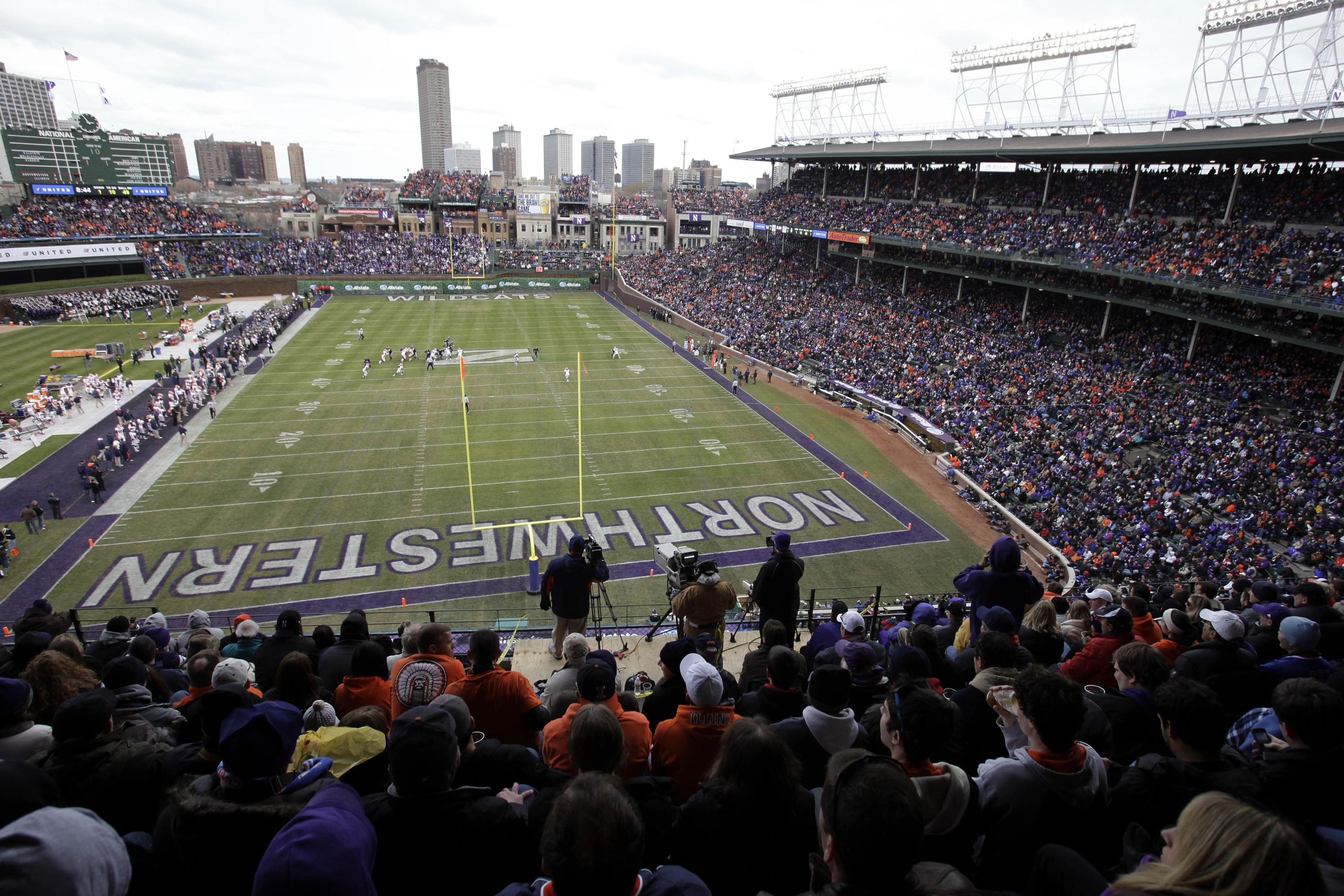 Iowa-Northwestern football game set for Wrigley in November | AP News