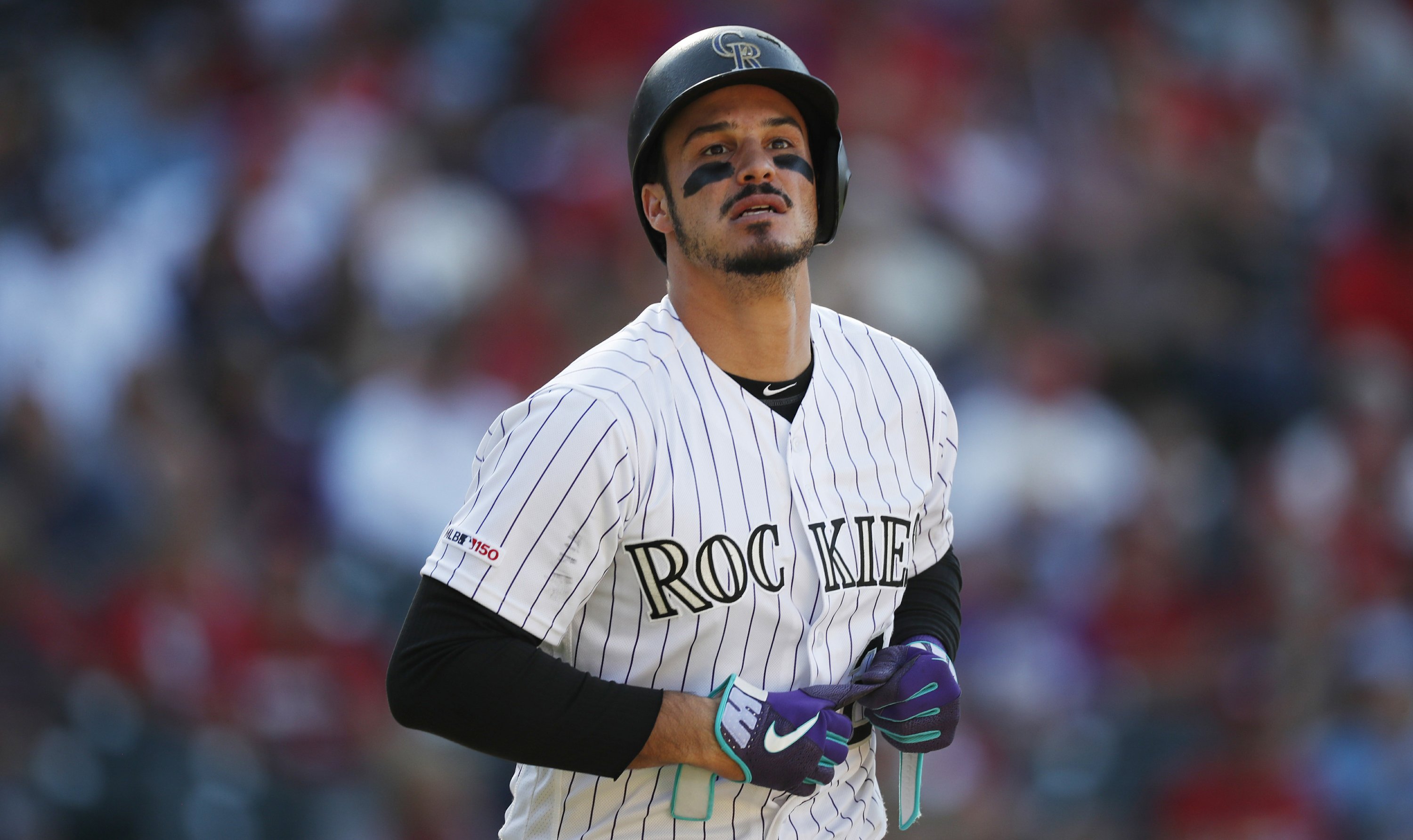 Arenado olvida fricciones con los Rockies... por ahora | AP News