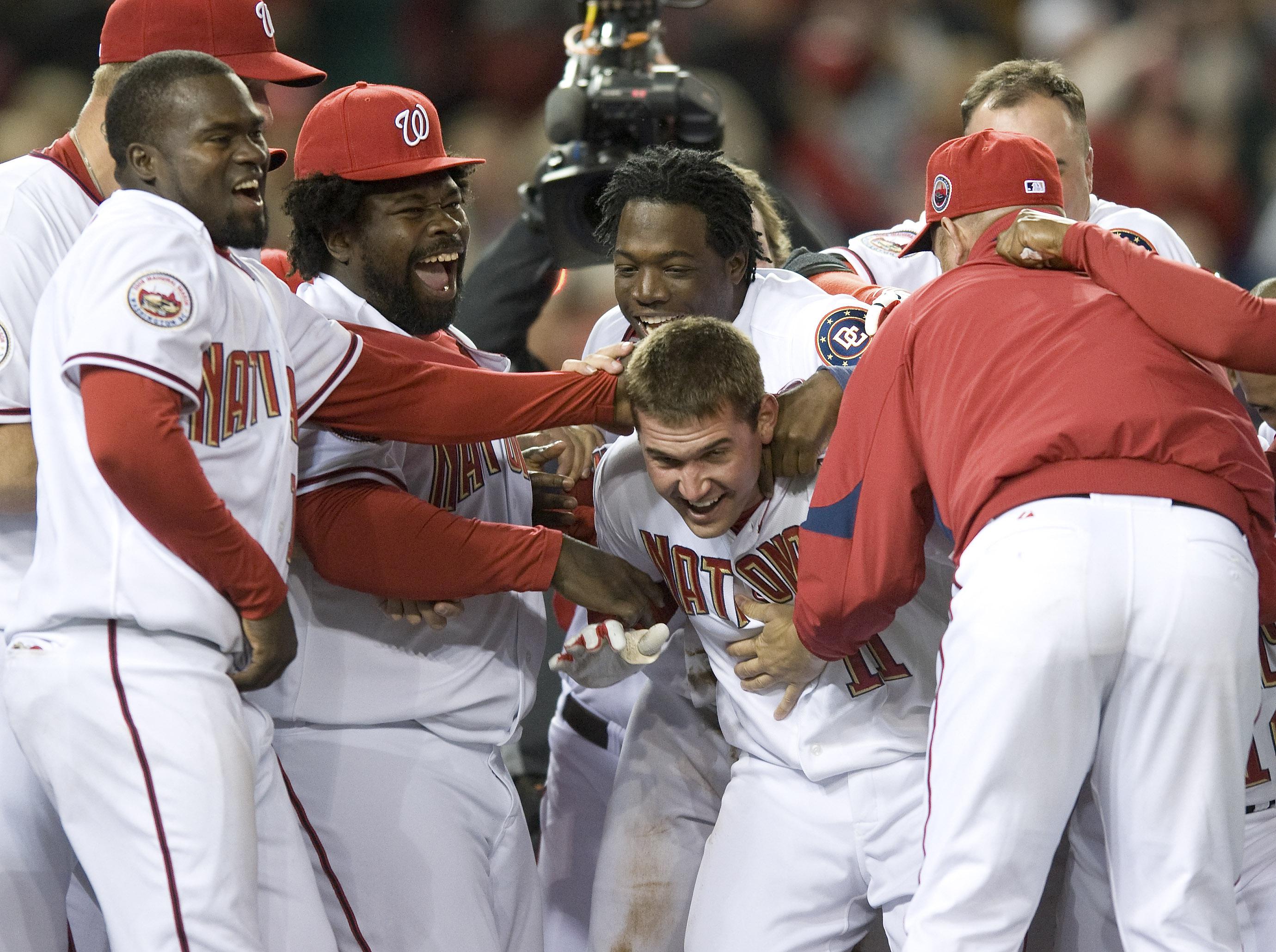 Nationals open new stadium by beating Braves 3-2 on Zimmerman's homer ...
