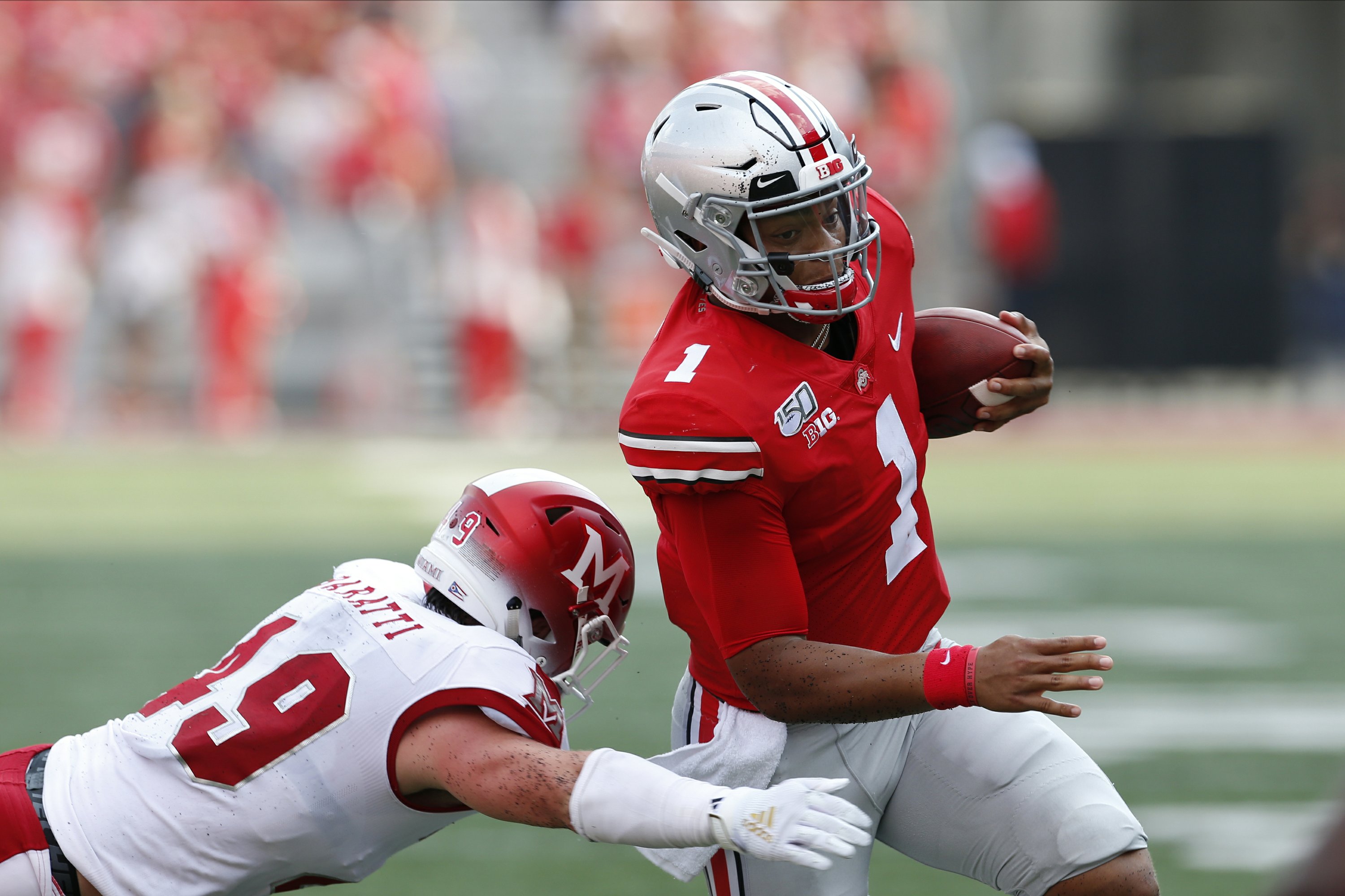 Justin Fields, No. 5 Buckeyes facing big test at Nebraska | AP News