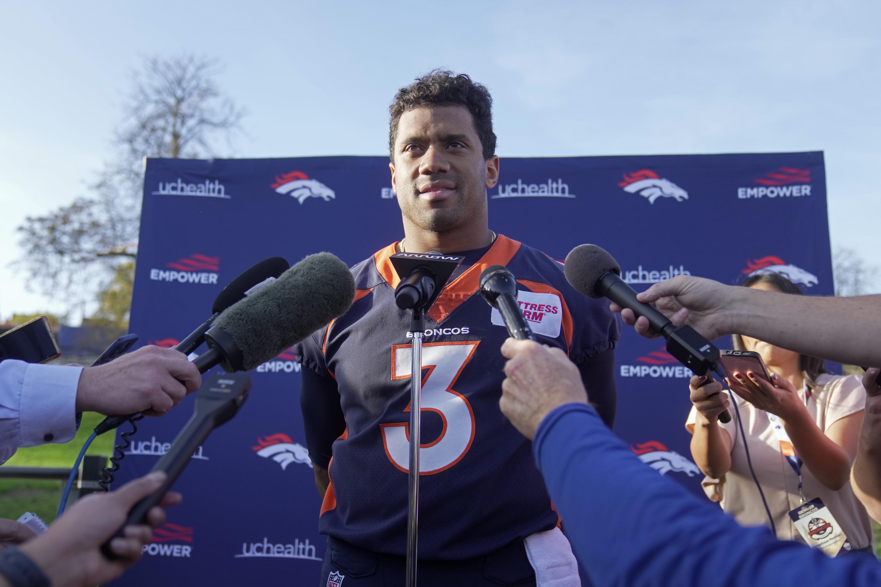 Broncos' Russell Wilson says he's 'ready to roll' in London | AP News