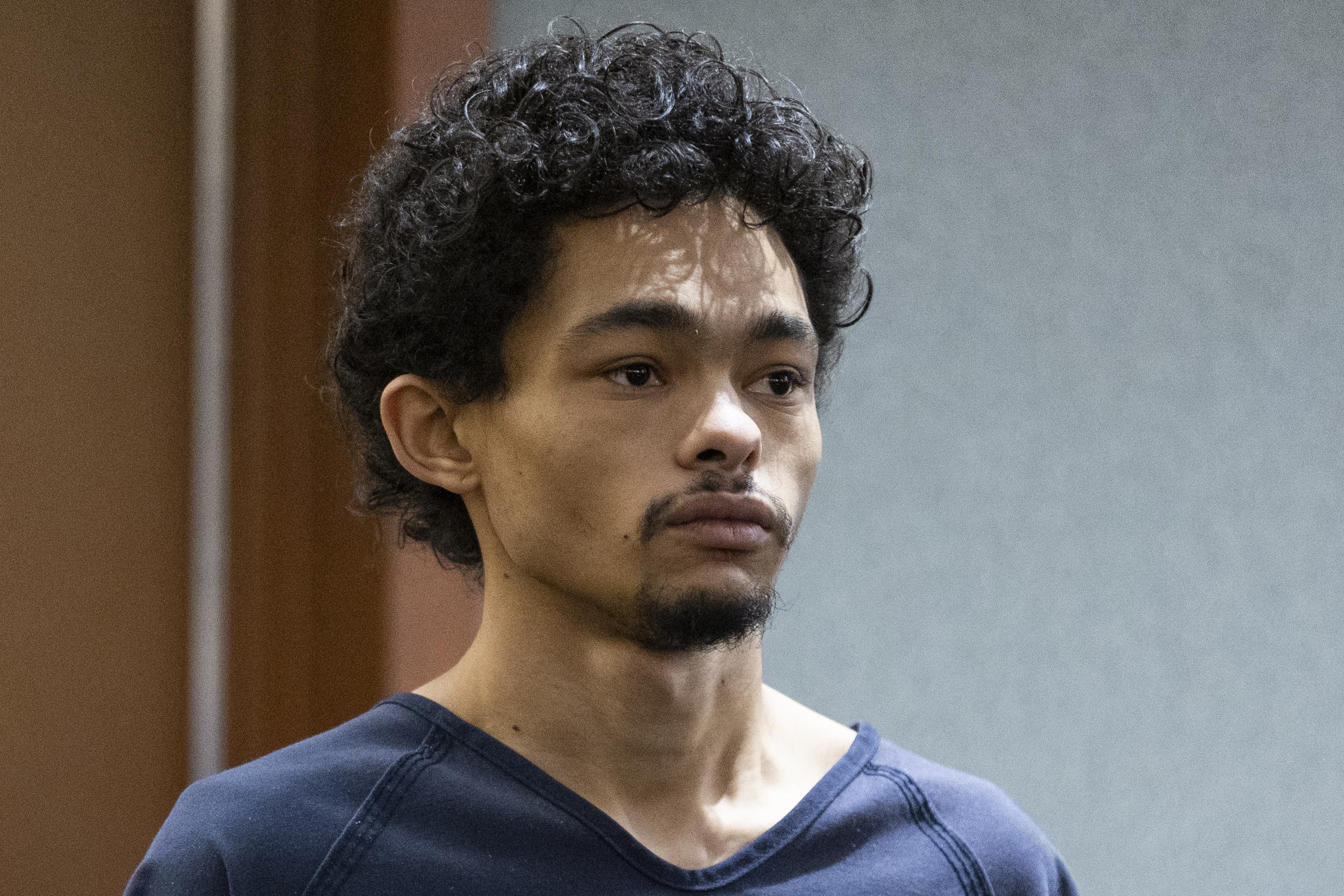 Man held in Vegas police officer killing gets new court date | AP News