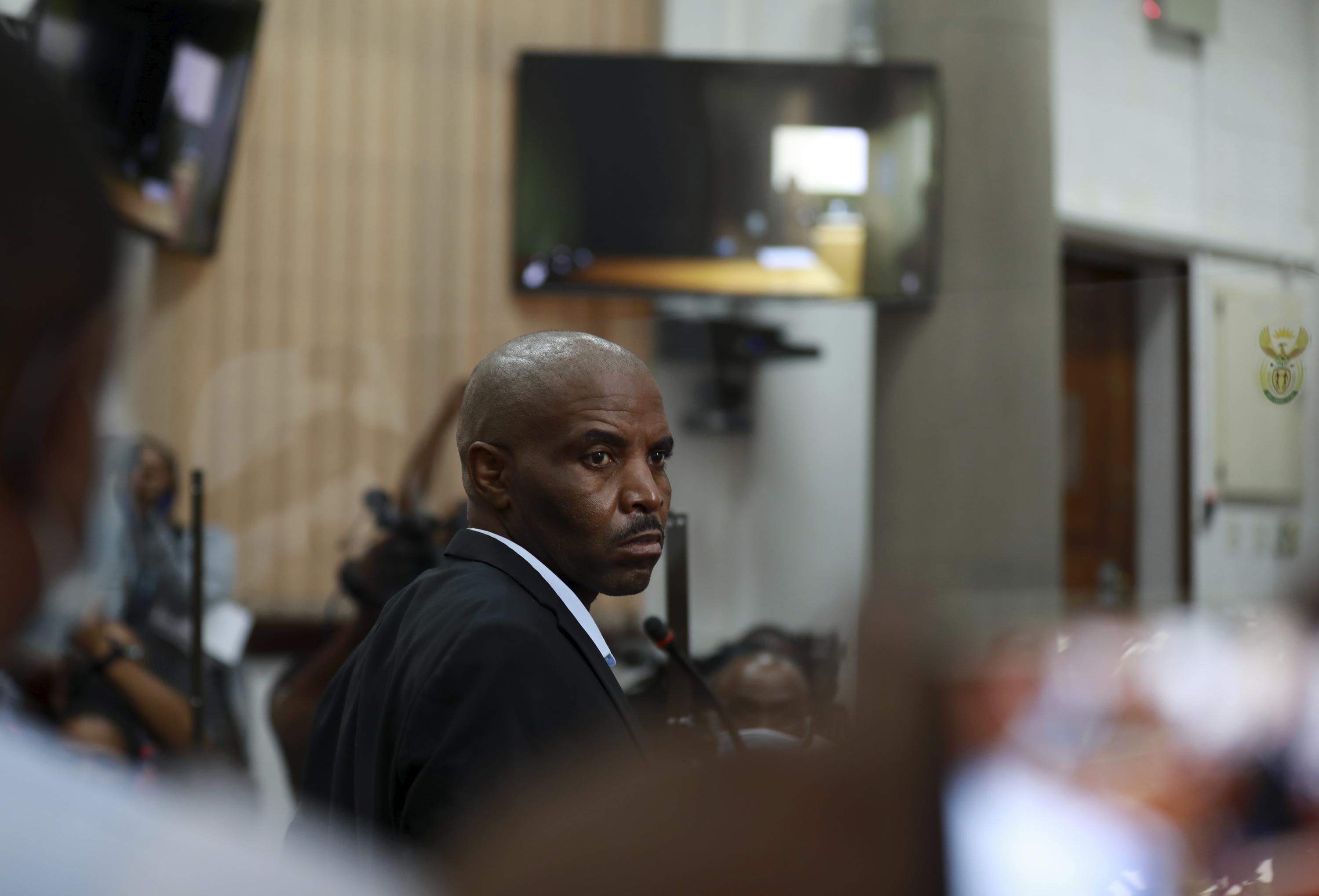 Terrorism charge for suspect in South Africa Parliament fire | AP News