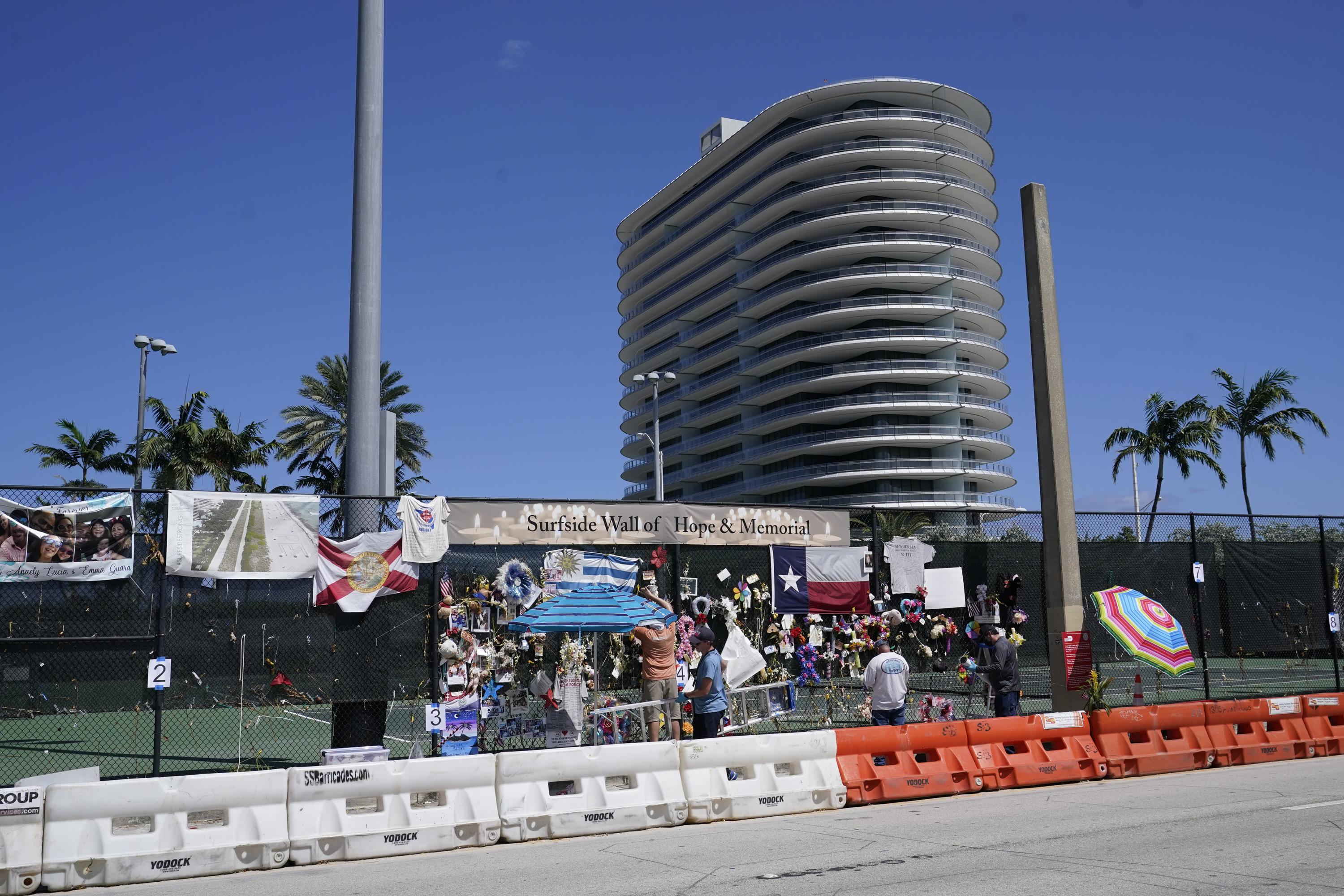 Plan approved to sell collapsed condo property to UAE outfit | AP News