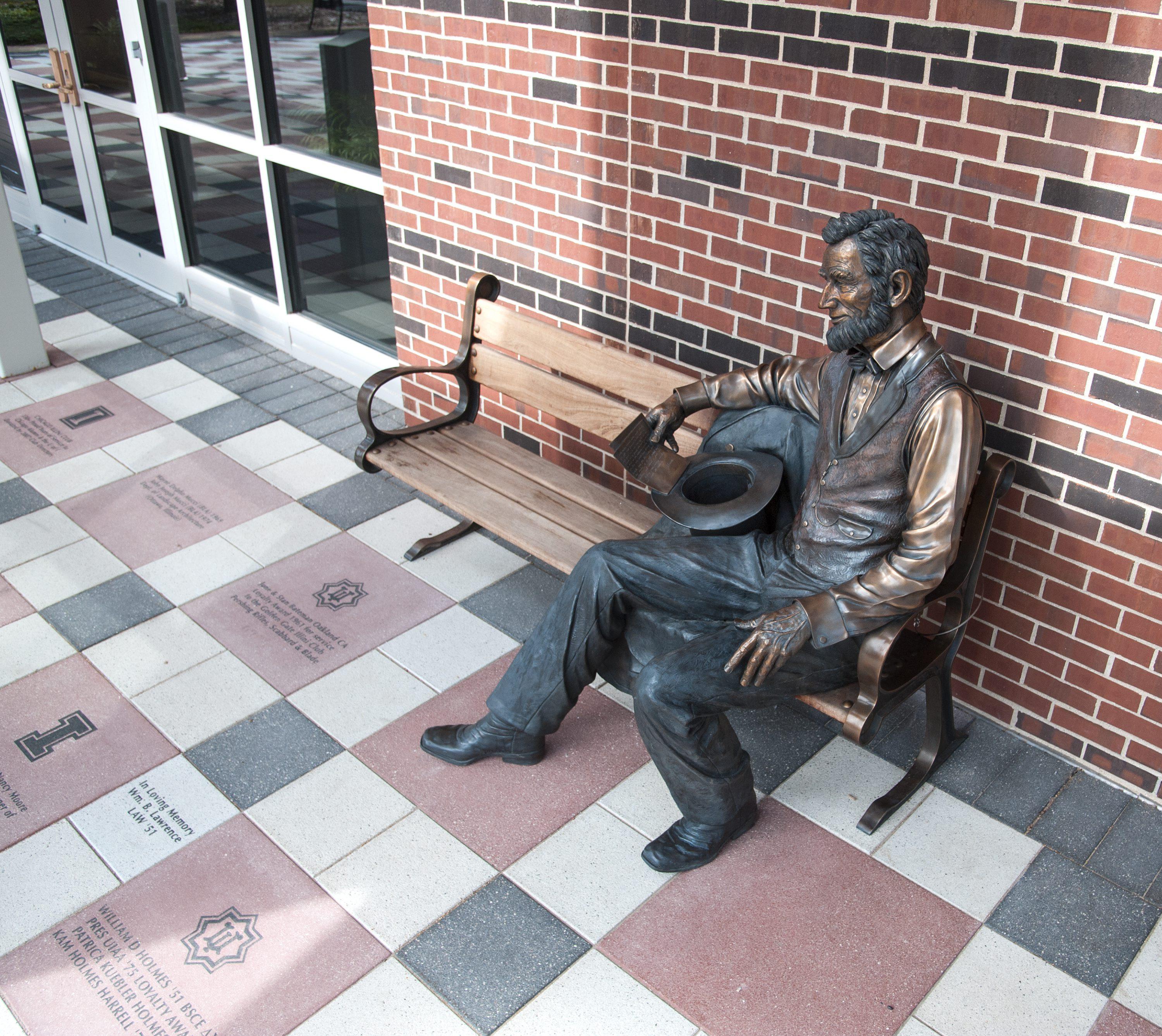 New, life-size Lincoln statue installed at U of I | AP News