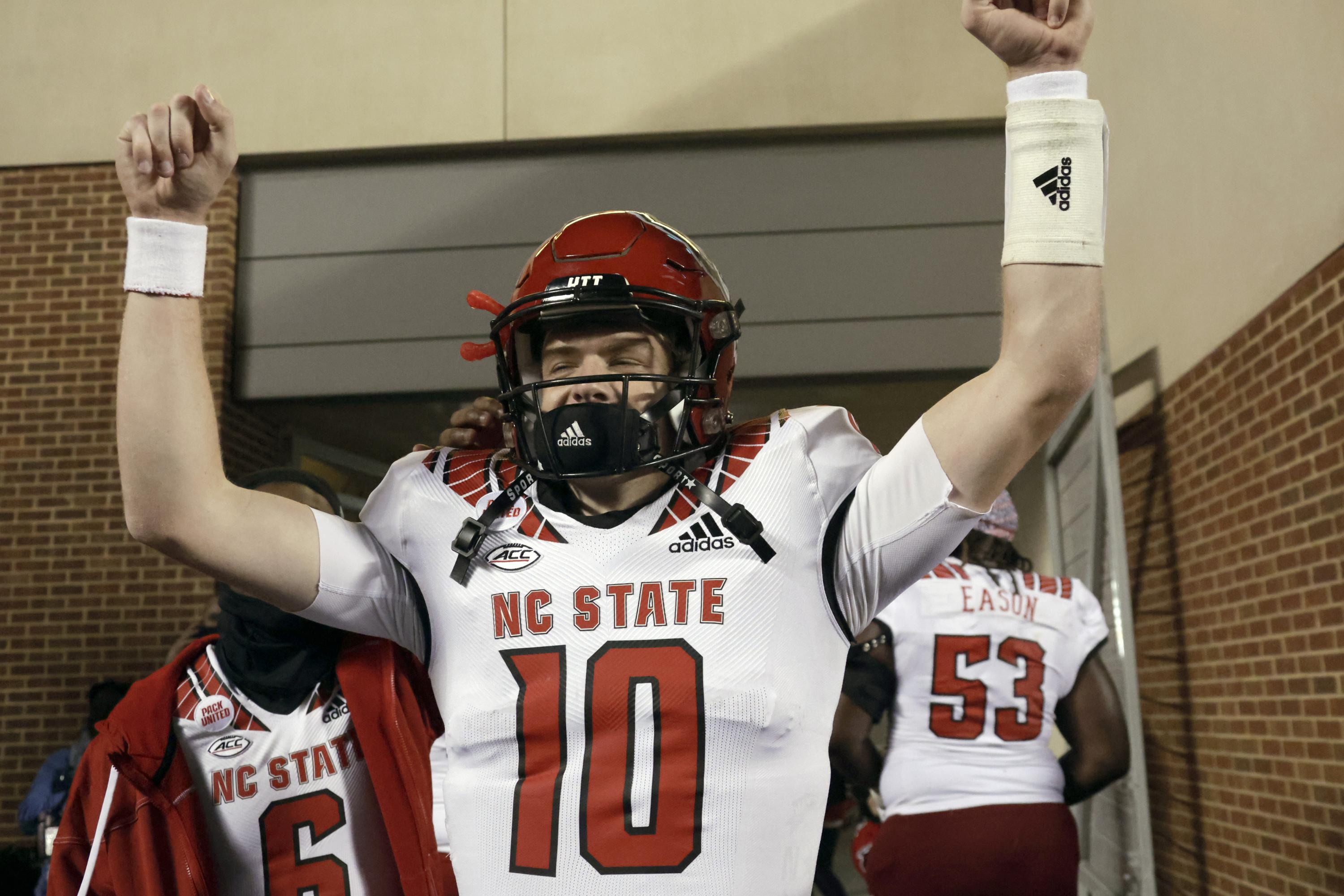 N.C. State holds on to beat No. 18 UNC 30-27 in 2OT | AP News