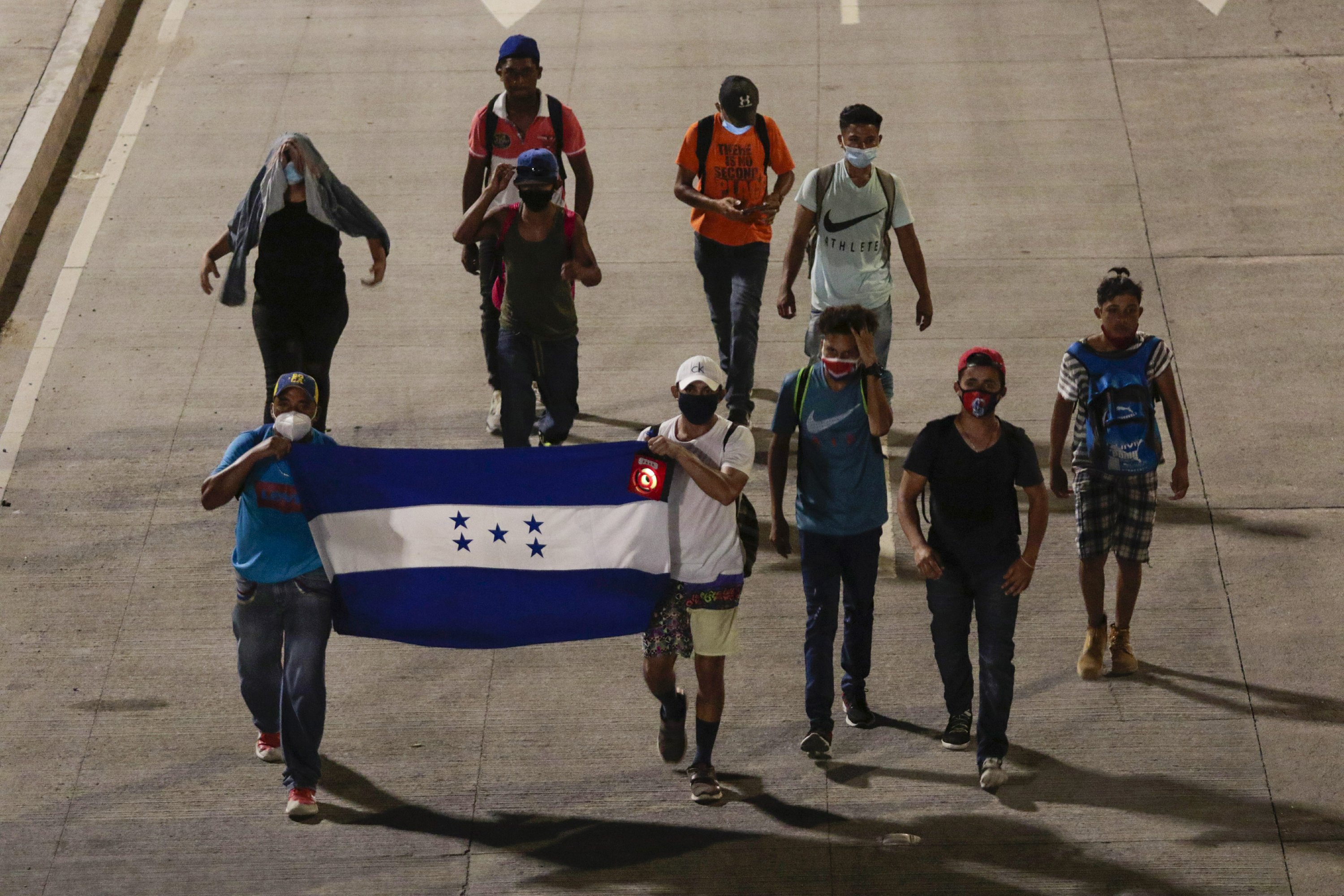 Hundreds of migrants set out from Honduras amid pandemic | AP News