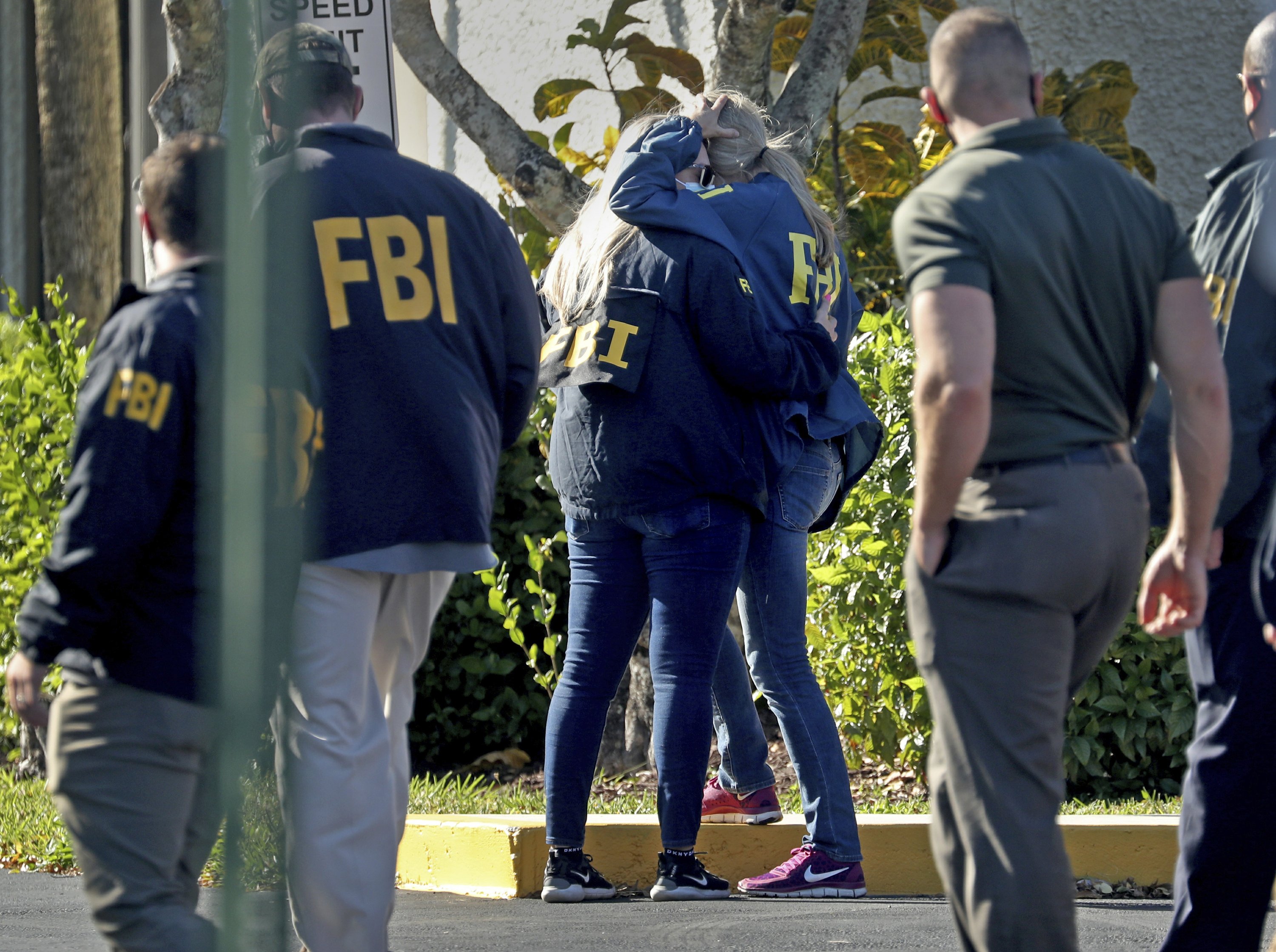 FBI slayings show risk surveillance cameras pose to police | AP News