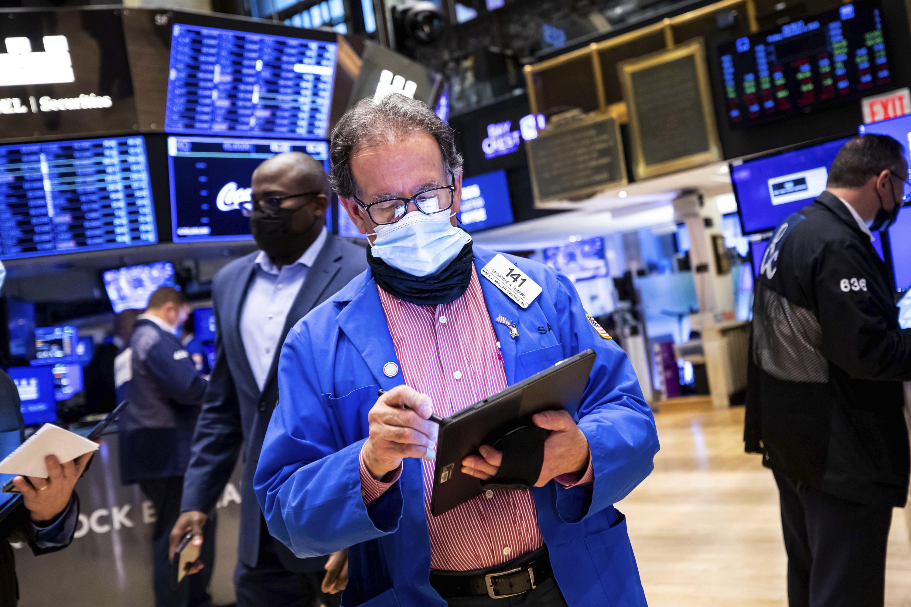 Stocks mixed, yields fly as jobs data raises rate outlook | AP News